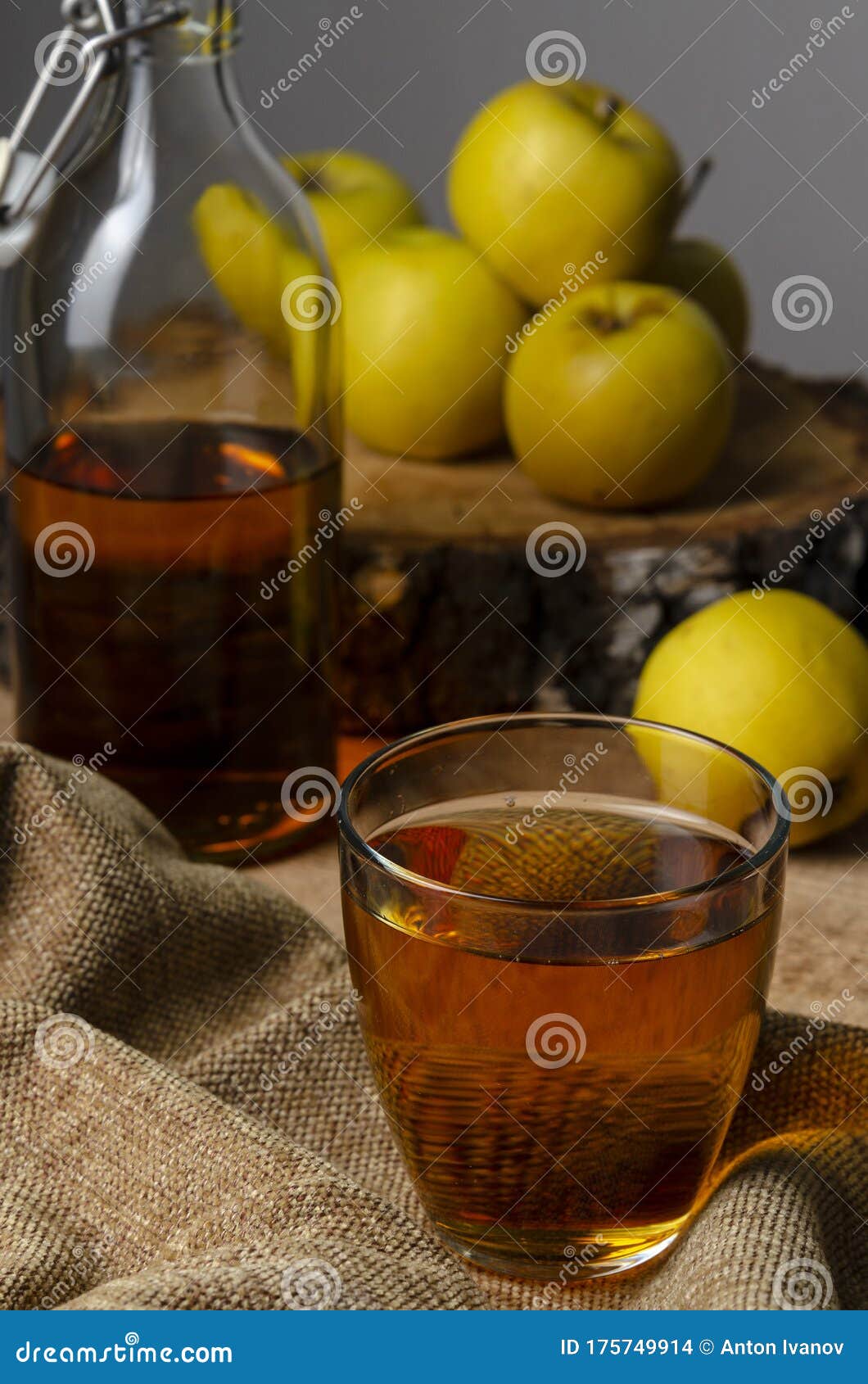 Full Bottle of Cider with Basket of Yellow Apples Stock Photo - Image ...