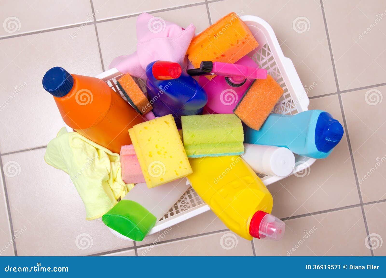 Full Box of Cleaning Supplies on Tiled Floor Stock Image - Image of ...
