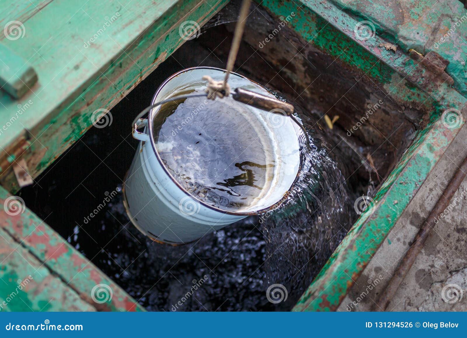 Full Bucket of Clear Water Got Out of a Deep Well Stock Photo - Image ...