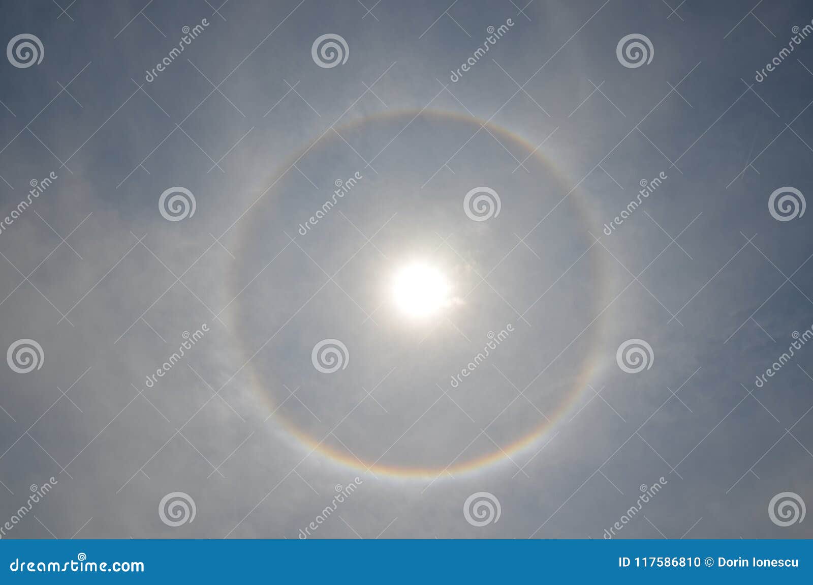 Full Circle Rainbow Around Sun at Noon, Rays Catch the Thin Vapour ...