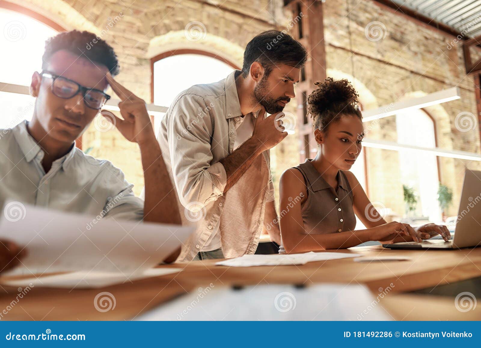 Full Concentration. Group of Young Business People Working Together ...