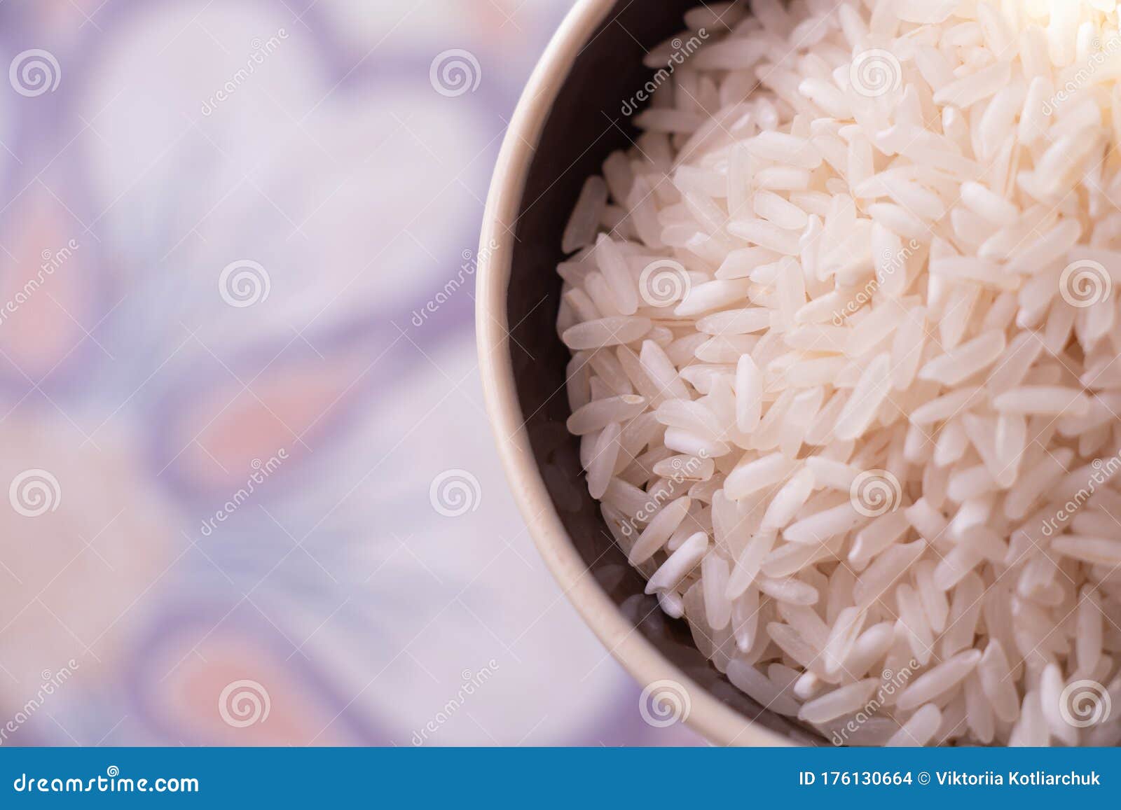 A Full Cup of Raw Long Grain Rice on a Table in the Kitchen Stock Photo ...