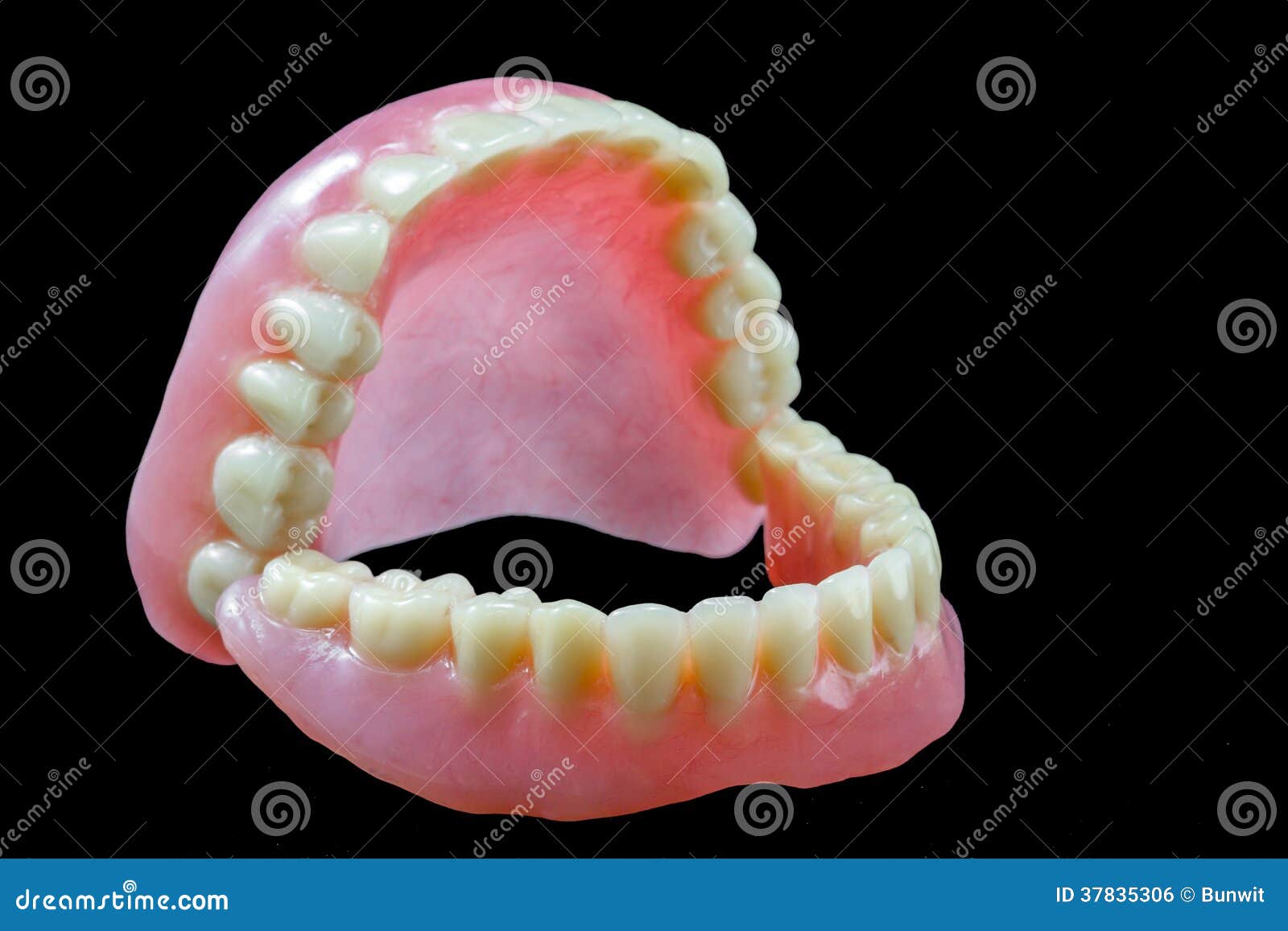 Full Denture on Black Background Stock Photo - Image of dentures ...