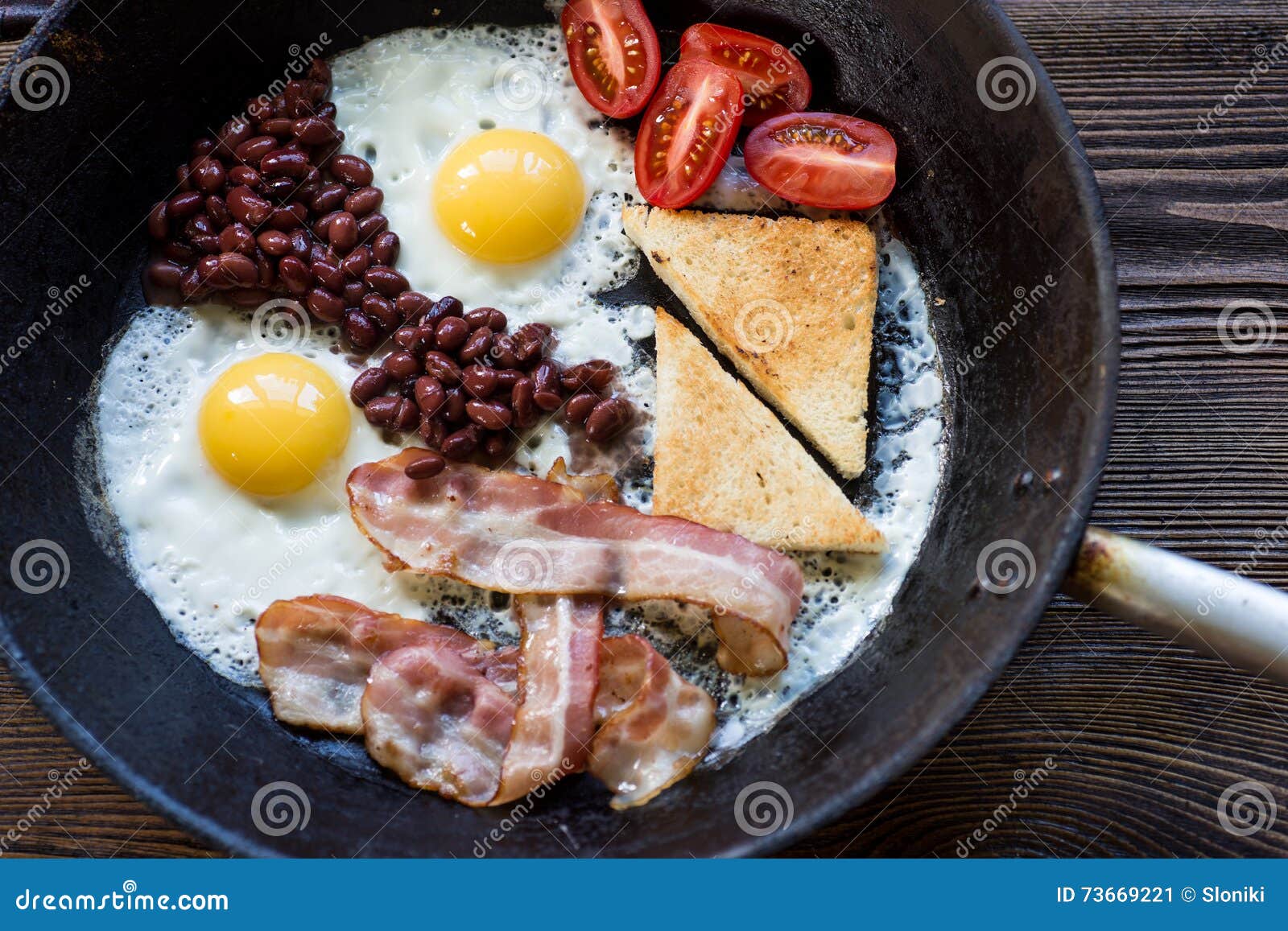 Full English Cooked Breakfast with Bacon, Fried Egg and Toasts. Stock ...