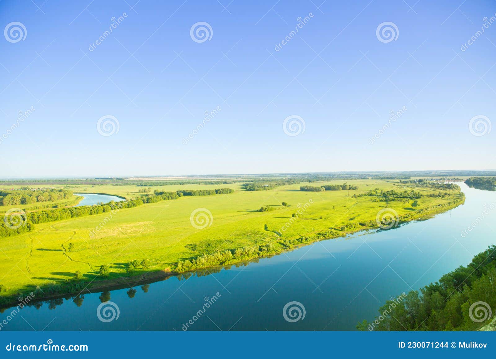 Full-flowing Flat River on a Warm Summer Evening in the Light of the ...