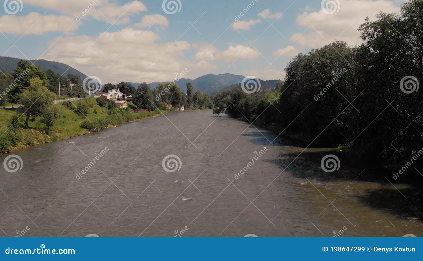 A Full-flowing River Flows Past the Trees. Stock Image - Image of ...