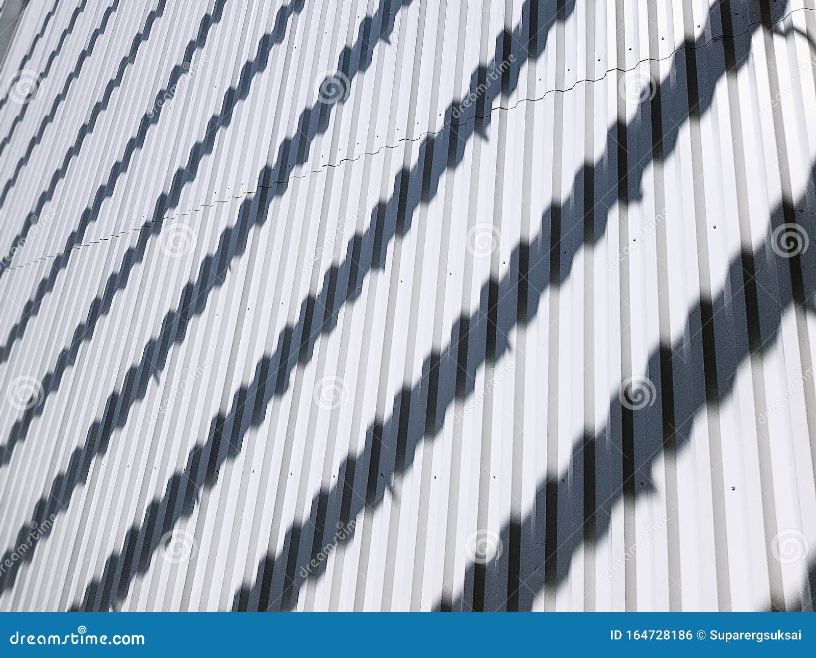 Background of Striped Shadows on White Corrugated Wall Stock Photo ...