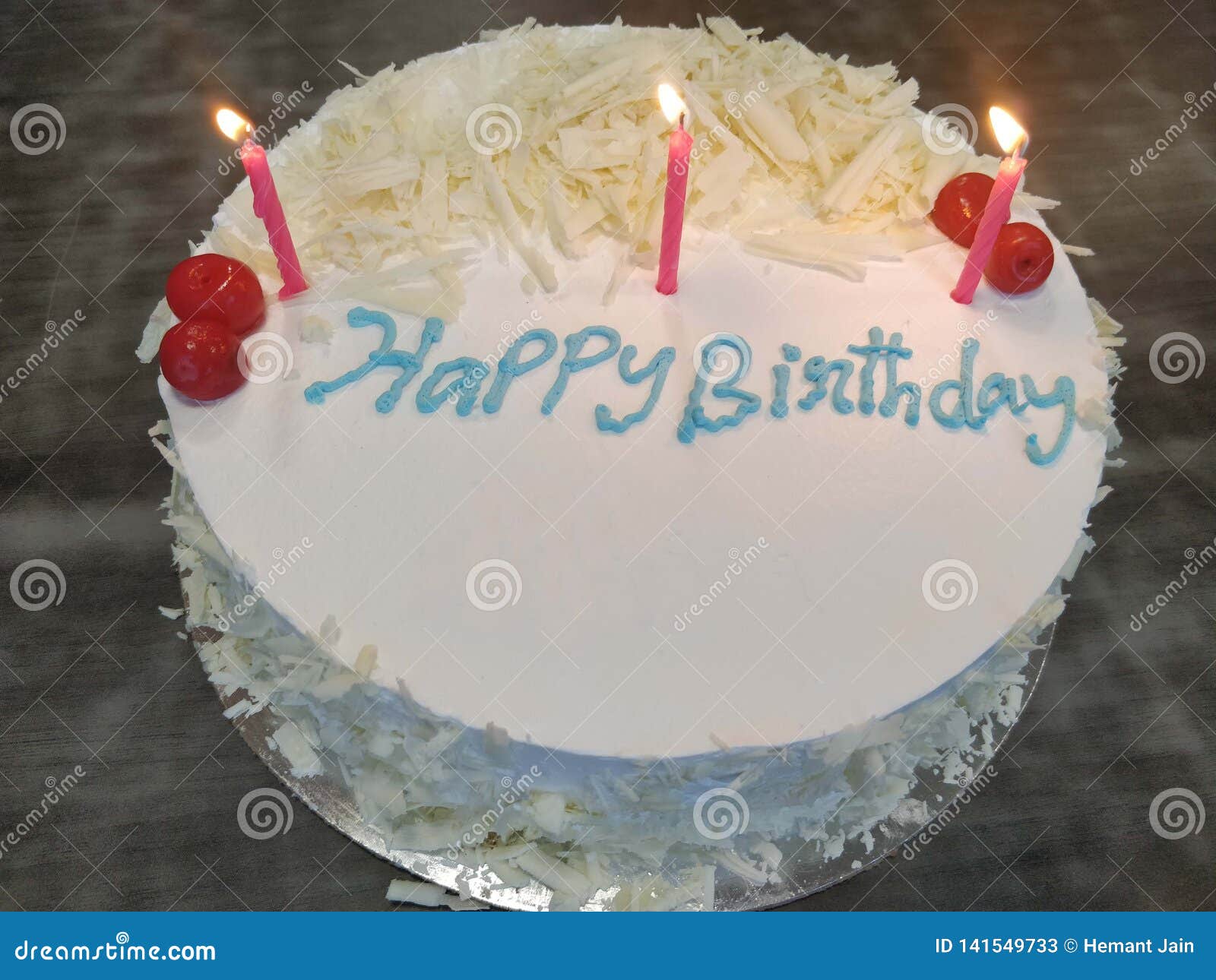 White Birthday Cake with Lit Candles Stock Image - Image of bakery ...