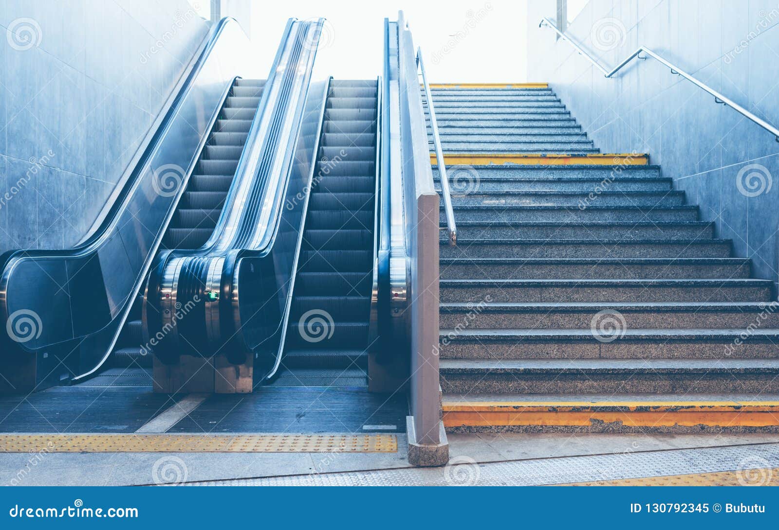 Full Frame Take of a Stone Staircase Next To a Modern Escalator Stock ...