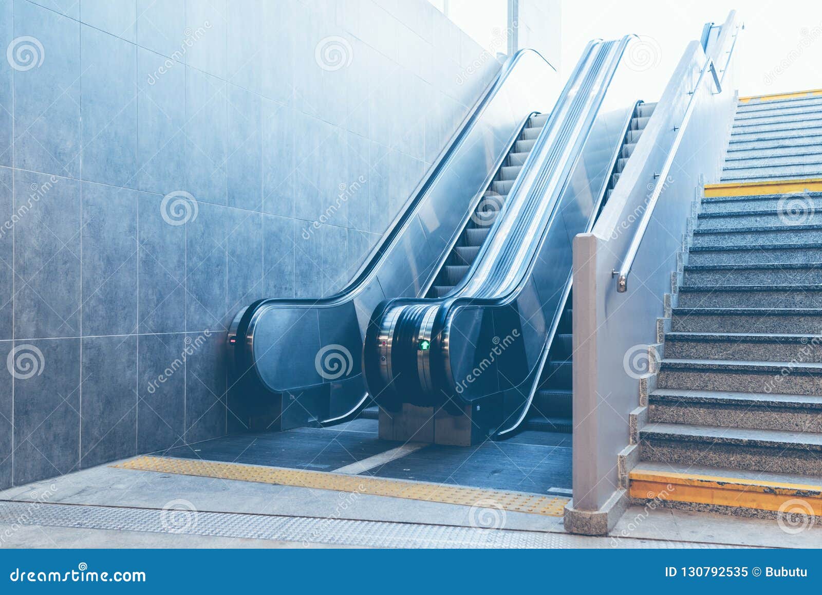 Full Frame Take of a Stone Staircase Next To a Modern Escalator Stock ...