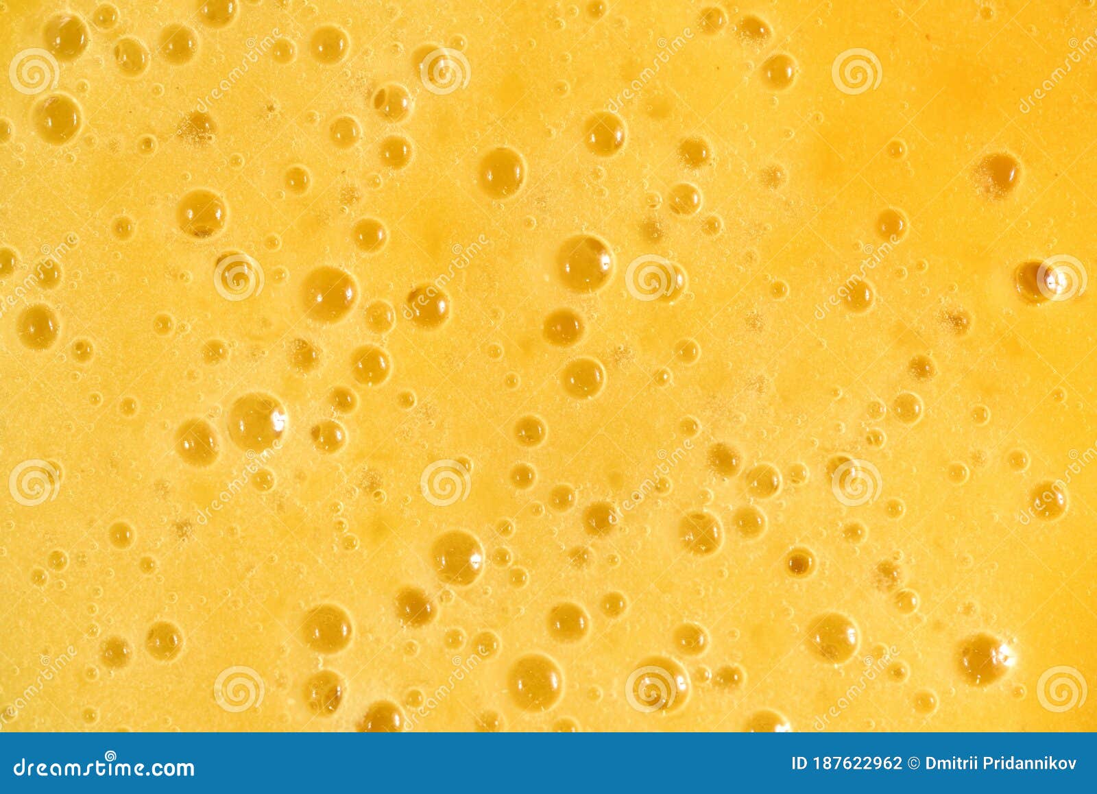 Full Frame Yellow Foam Texture with Bubbles of Mango and Banana Fruit ...