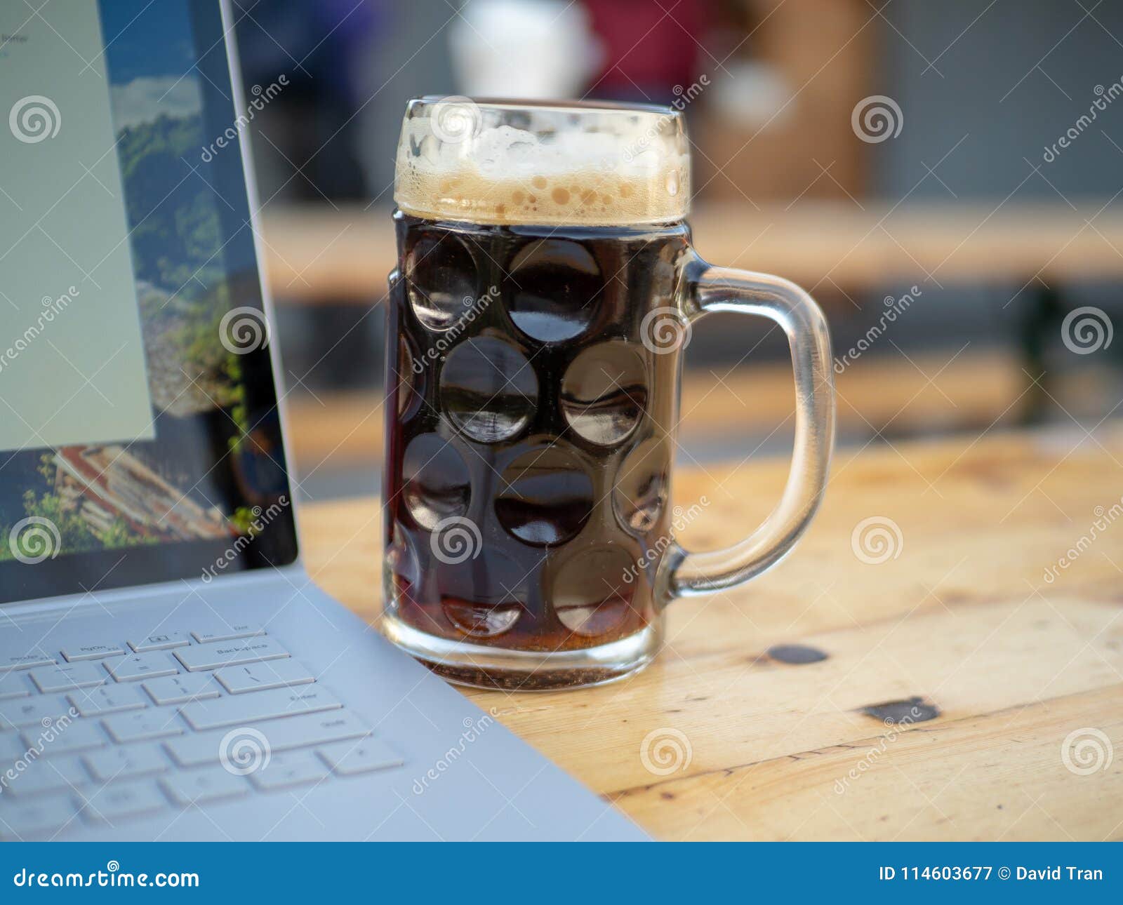 Full Glass Beer Mug Sitting Next To Laptop Computer Stock Image - Image ...