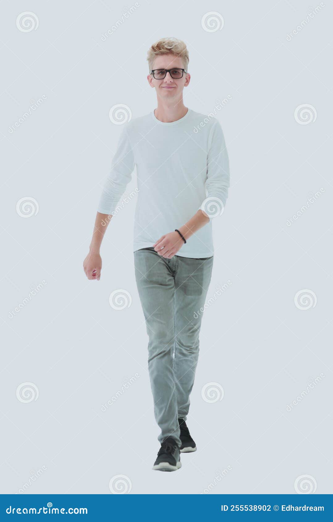 In Full Growth. Confident Young Man Striding Forward Stock Photo ...