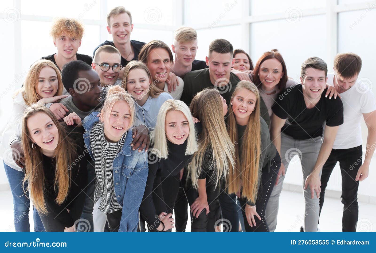 In Full Growth. Happy Young People Standing Together Stock Image ...