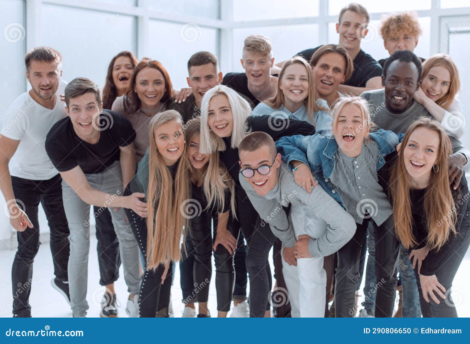 In Full Growth. Happy Young People Standing Together Stock Photo ...