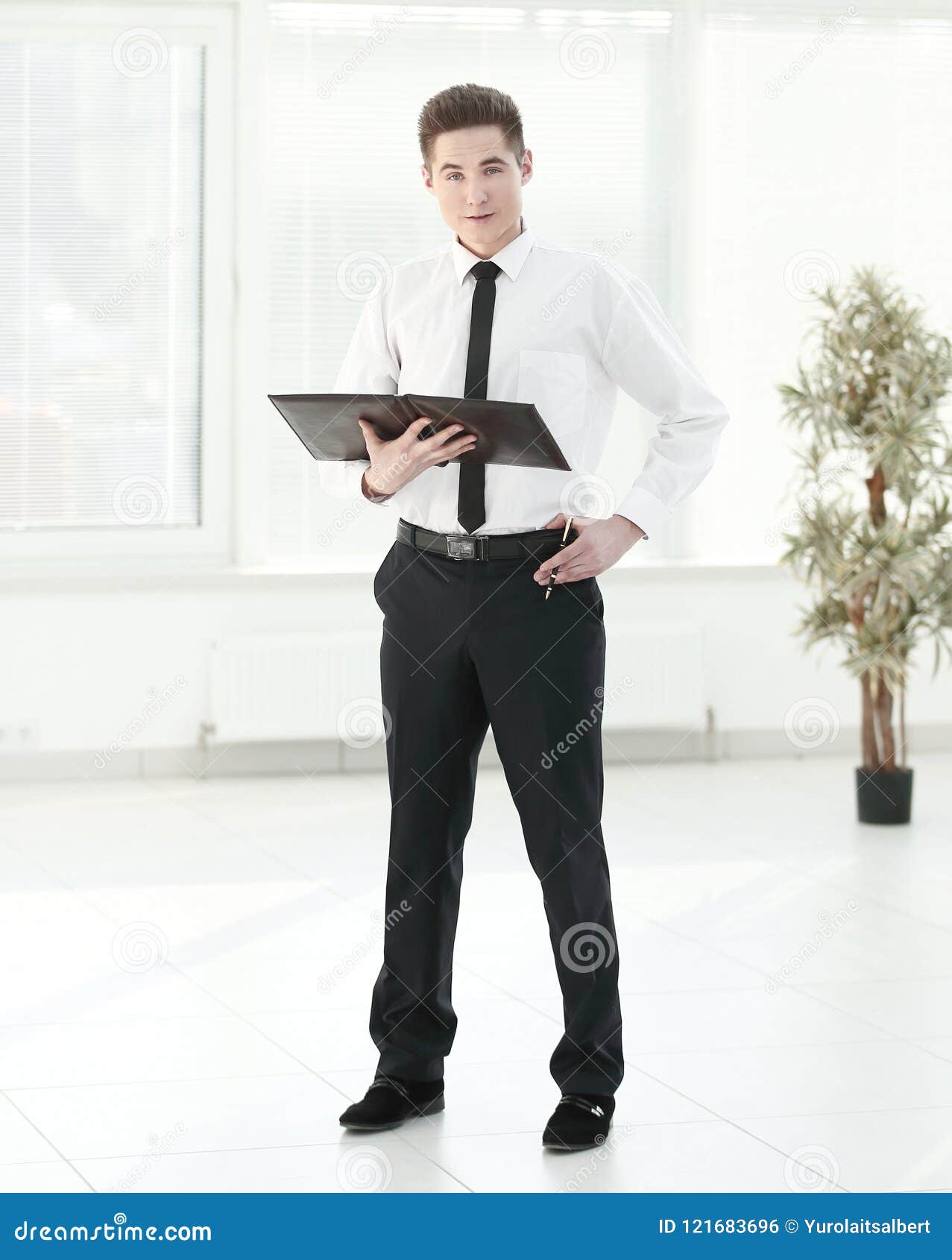 Serious Employee Posing With His Colleagues On Background Royalty-Free ...