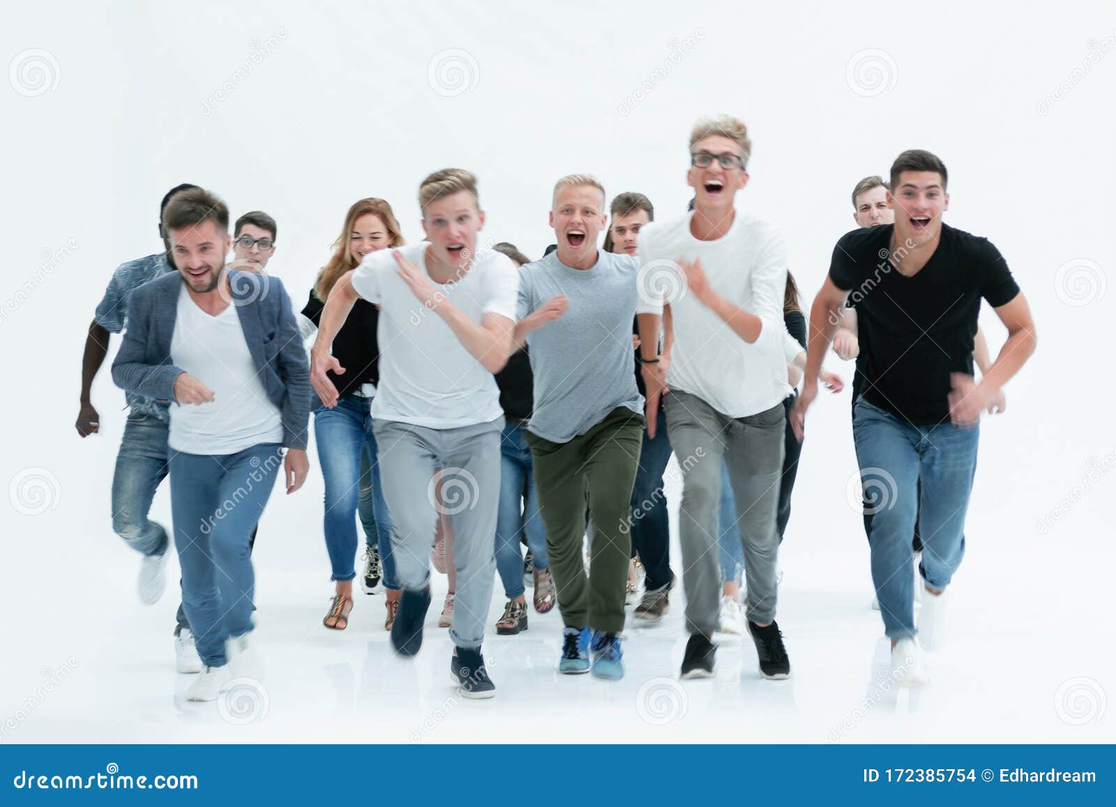 In Full Growth. Smiling Young People Quickly Run Forward Stock Photo ...