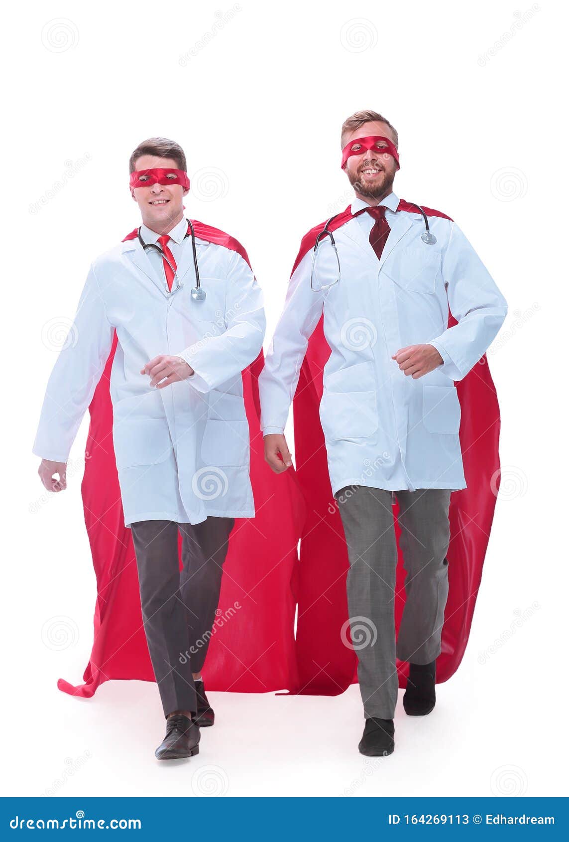 In Full Growth. Two Smiling Super Doctor Confidently Go Forward Stock ...