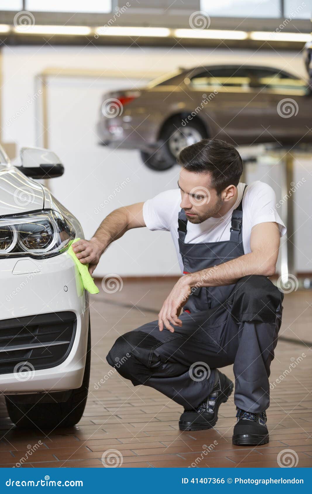 Full Length Automobile Mechanic Cleaning Car Workshop Stock Photos ...