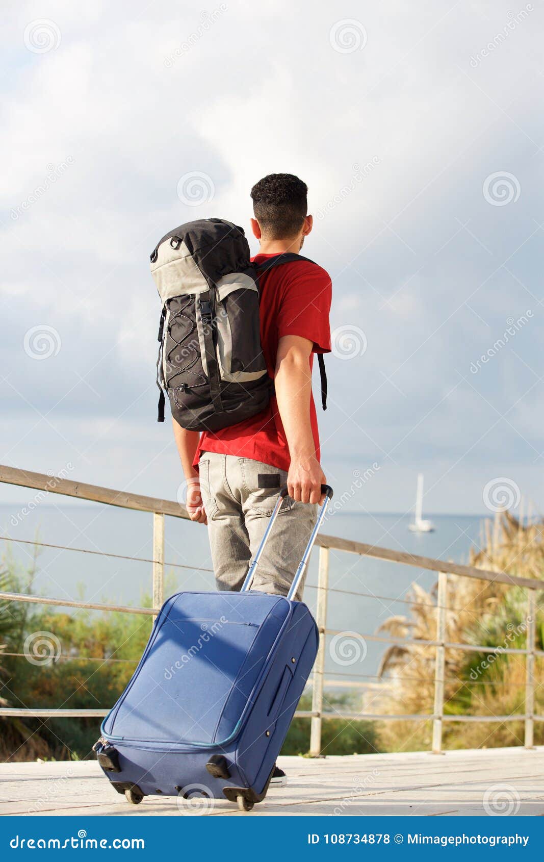 Full Length Backpacker Walking Away Backpack and Suitcase Stock Photo ...