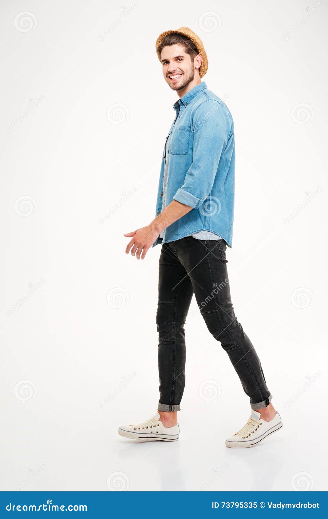 Full Length of Cheerful Young Man Walking and Smiling Stock Image ...