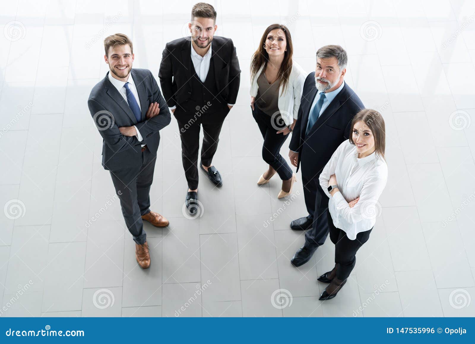 Full Length Confident Business Team Stands in Office. Stock Photo ...