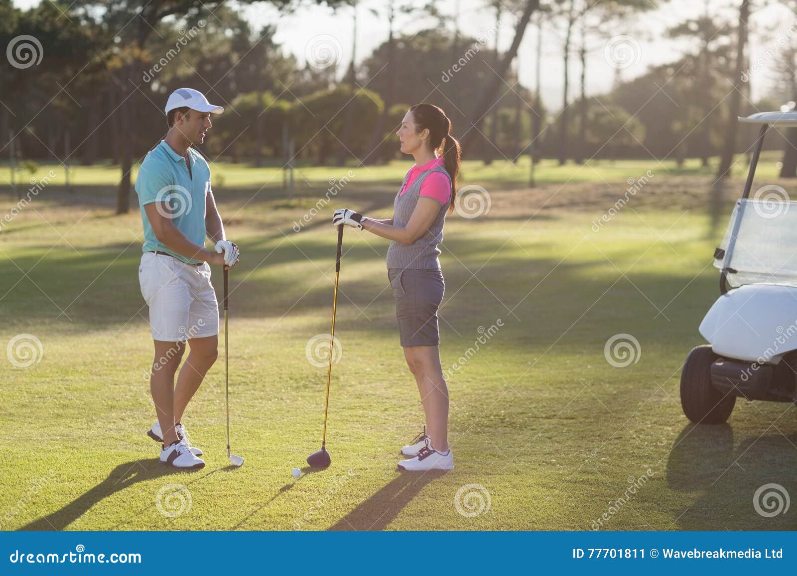 Full Length of Golf Player Couple Stock Image - Image of holding ...