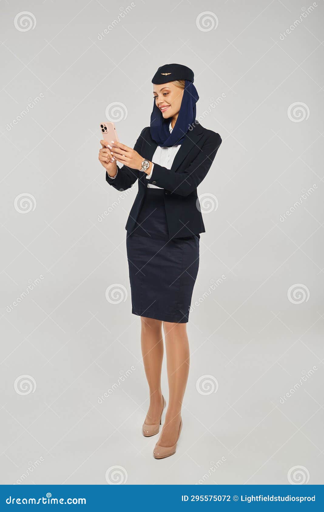 Full Length of Happy Stewardess in Stock Photo - Image of corporate ...