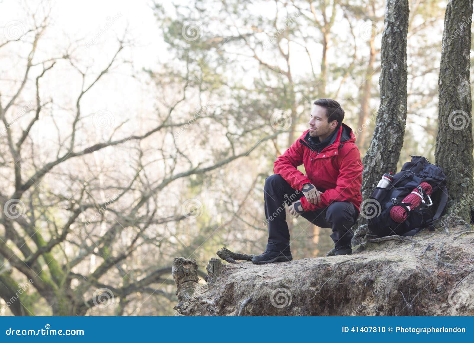 Full Length Male Hiker Crouching Cliff Forest Stock Photos - Free ...