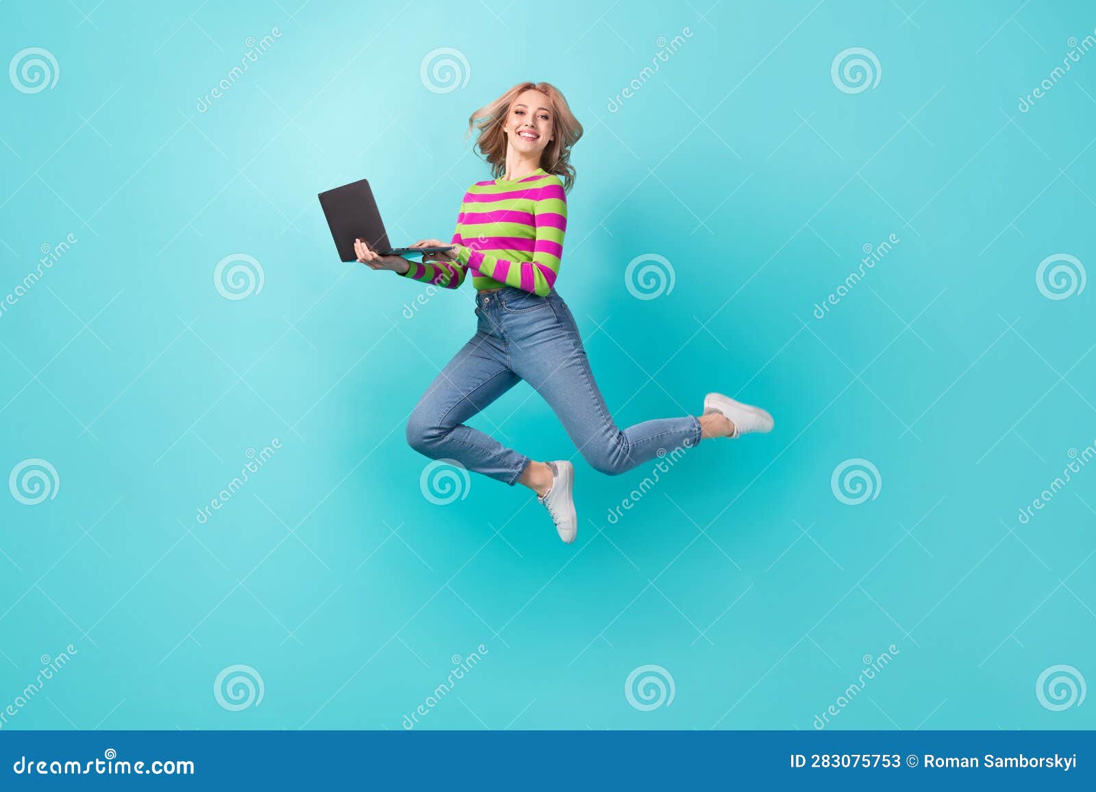 Full Length Photo Of Cute Sweet Woman Dressed Striped Sweater Jumping