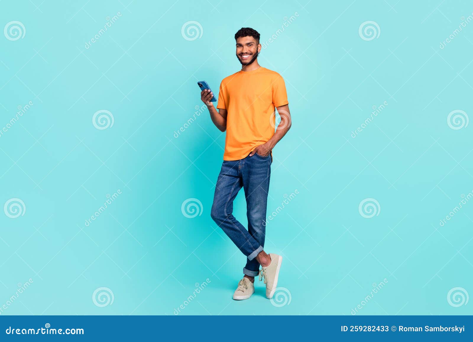 Full Length Photo Of Good Funny Pretty Guy Wear Orange T Shirt