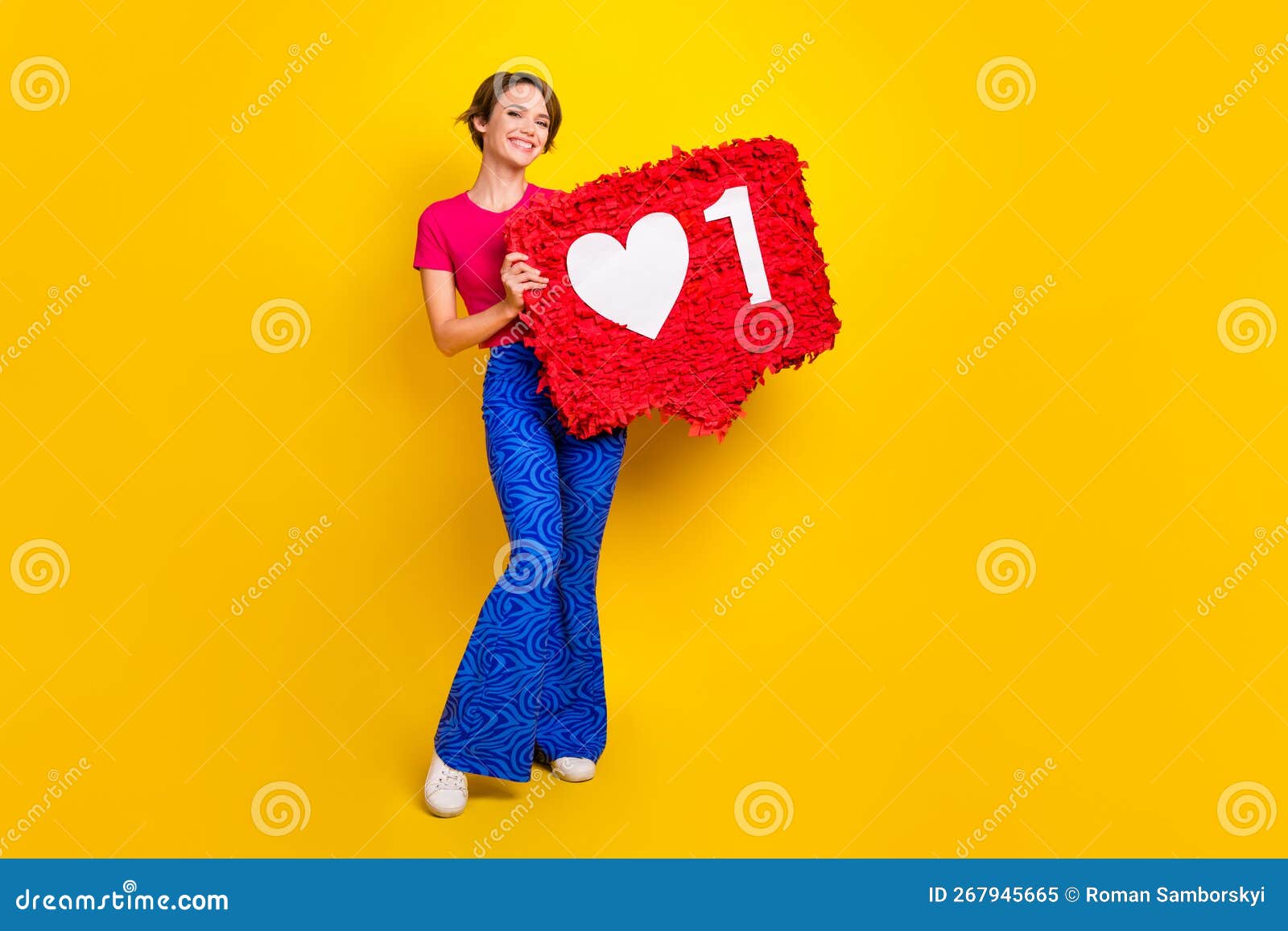 Full Length Photo Of Pretty Cute Woman Dressed Pink T Shirt Holding
