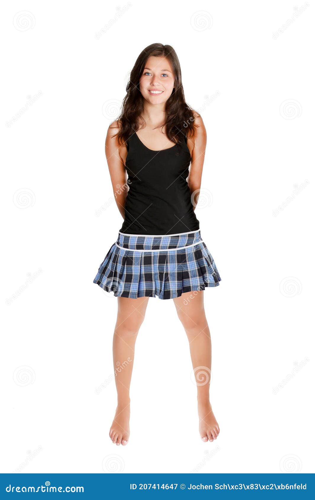 Full Length Portrait of a Beautiful Young Woman Wearing a Black Top and ... Full Length Portrait of a Beautiful Young Woman Wearing a Black Top and ...