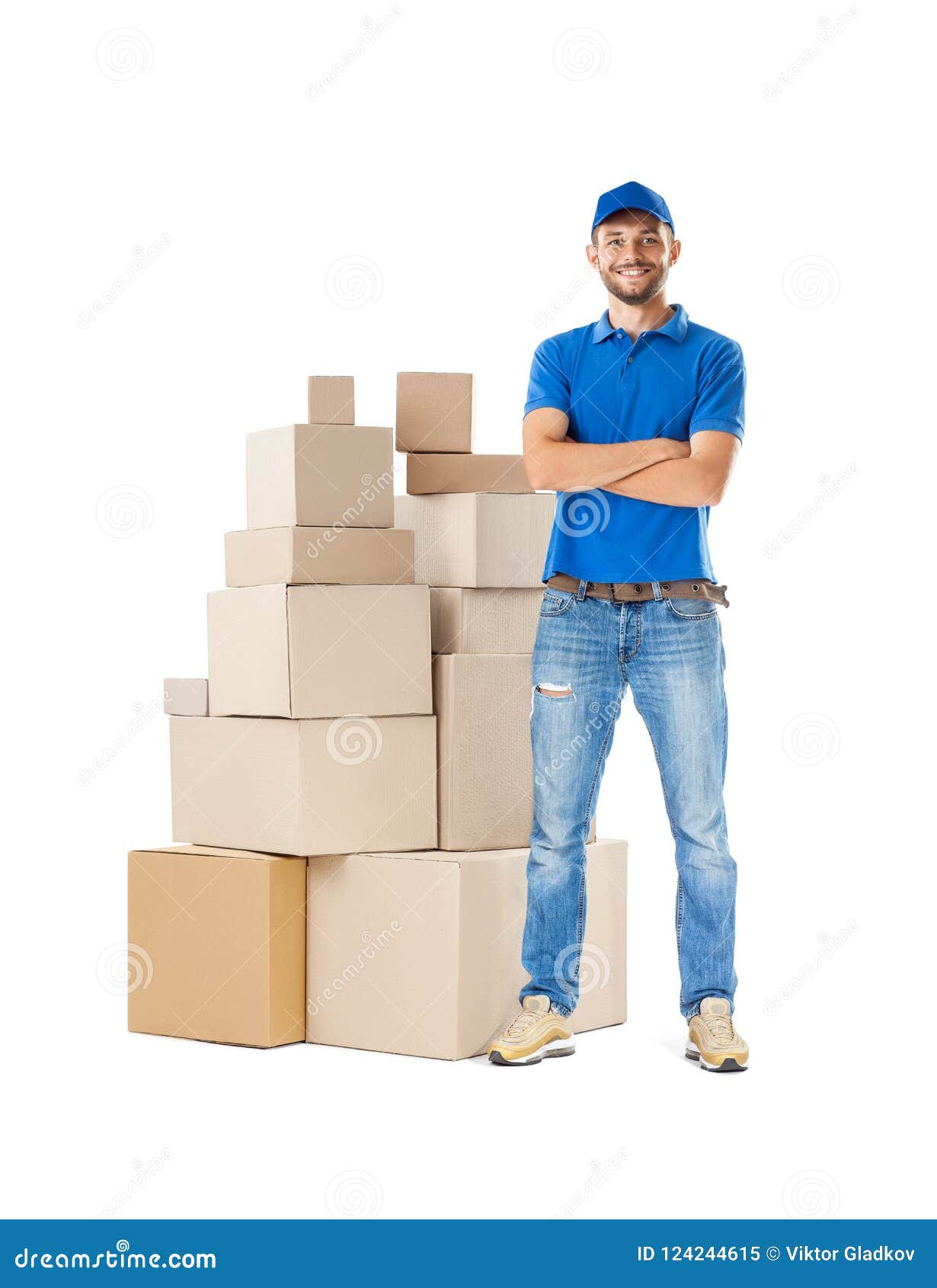 Full Length Portrait Of Delivery Man Standing Near Stack Of Boxes ...