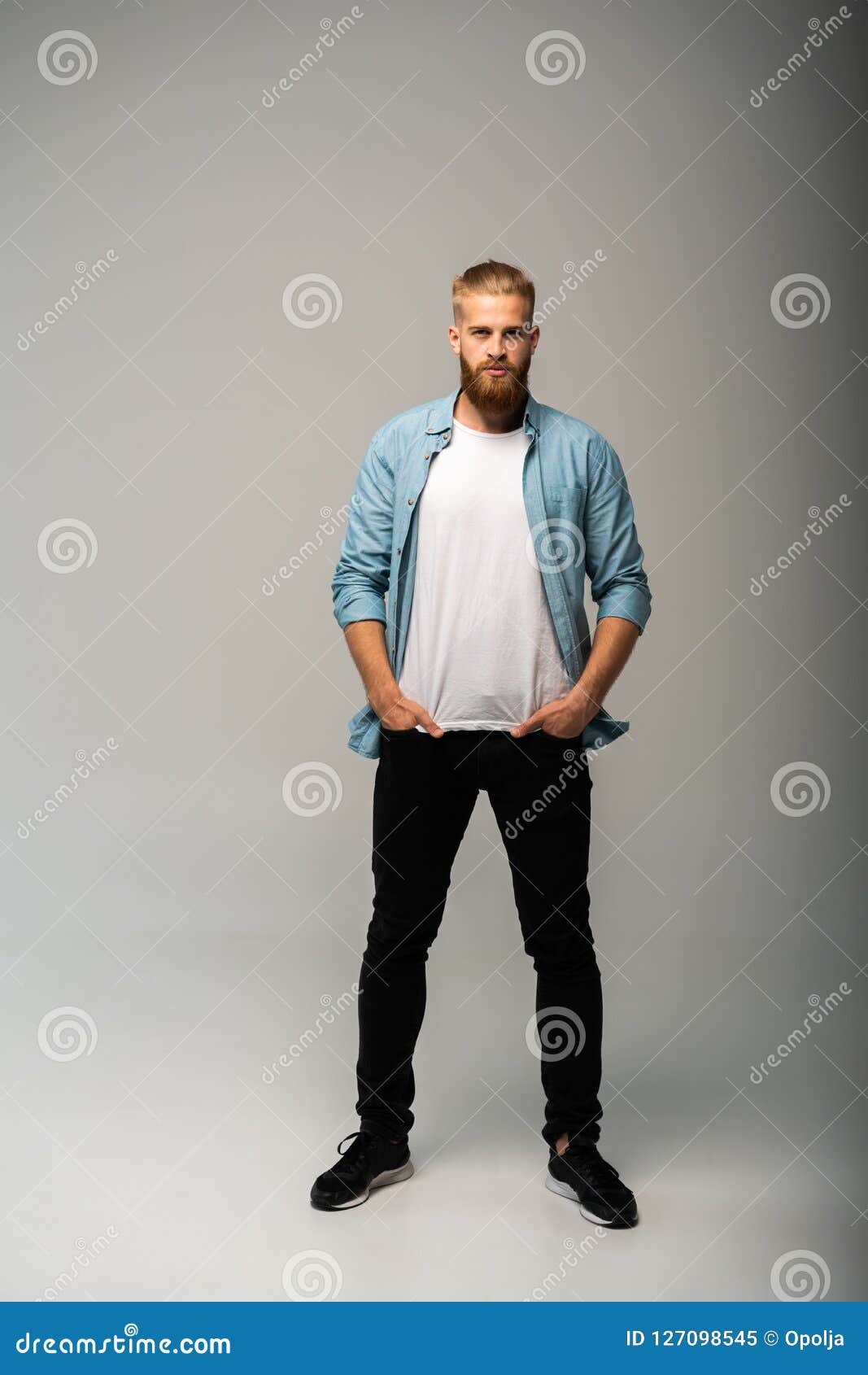Full Length Portrait Of A Happy Casual Man Standing Isolated On A Gray ... Full Length Portrait Of A Happy Casual Man Standing Isolated On A Gray ...