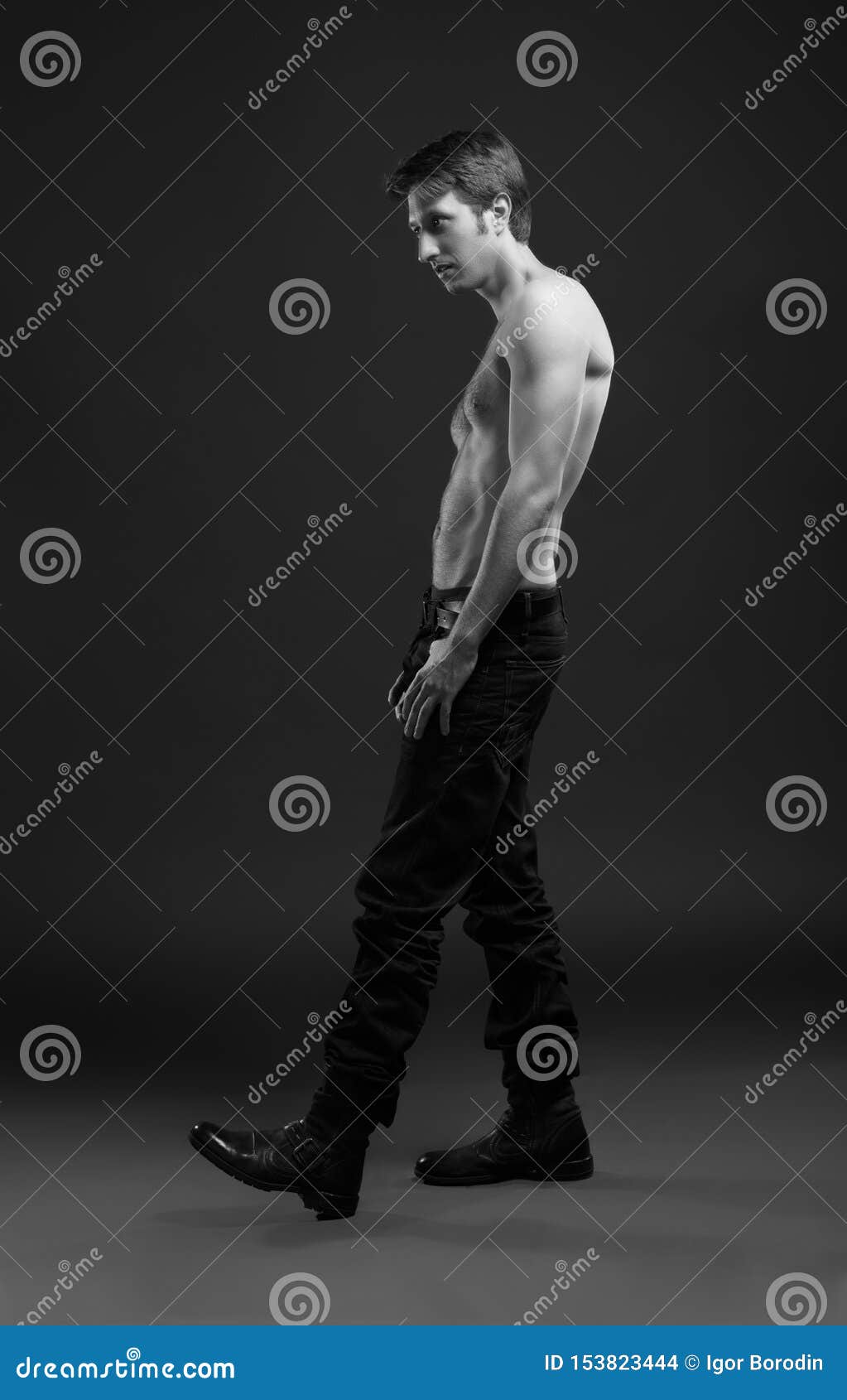 Full Length Portrait of a Young Man in Jeans and Shirtless Posing at ... Full Length Portrait of a Young Man in Jeans and Shirtless Posing at ...