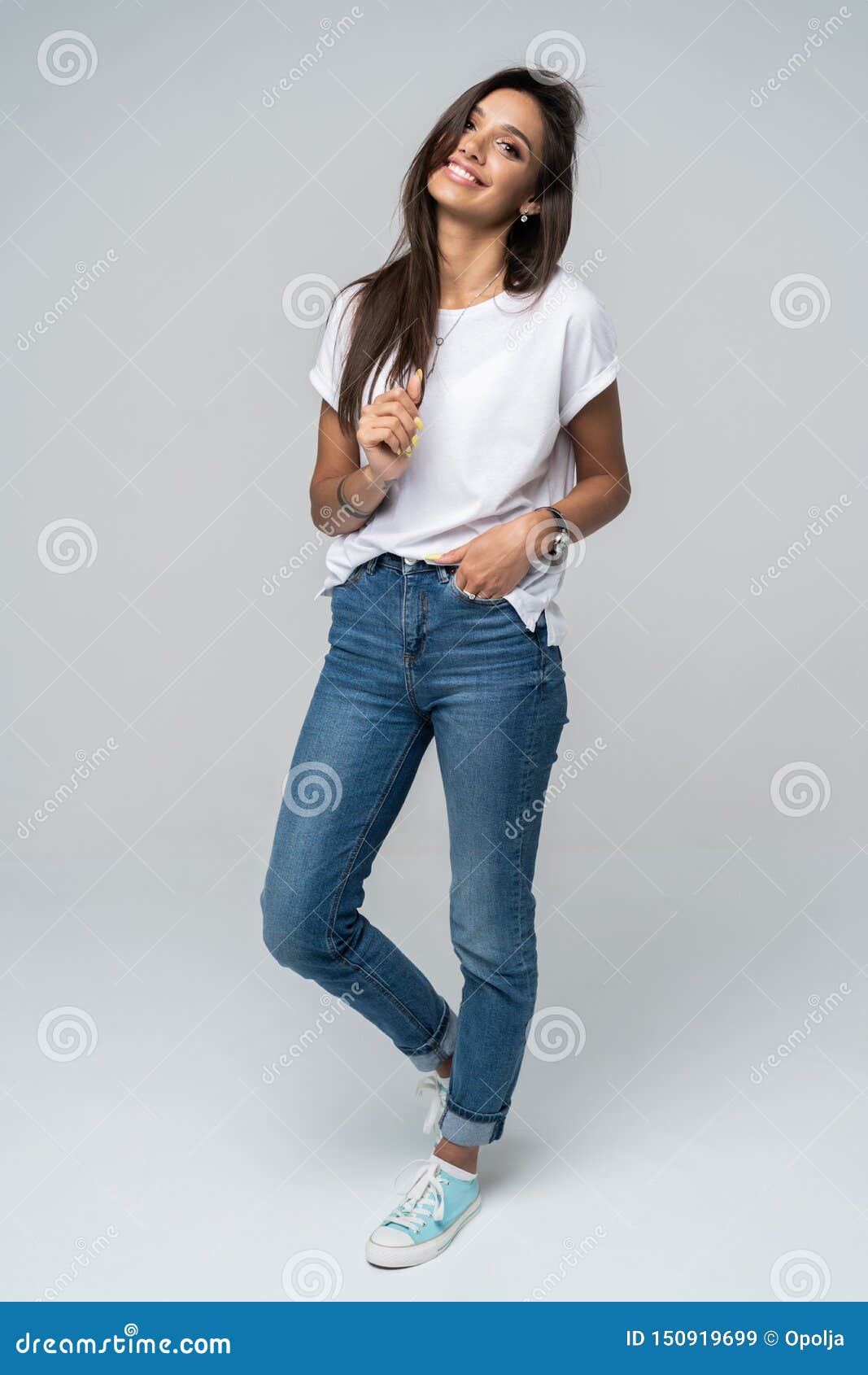 Full Length Portrait of a Smiling Pretty Woman Over White Background ... Full Length Portrait of a Smiling Pretty Woman Over White Background ...