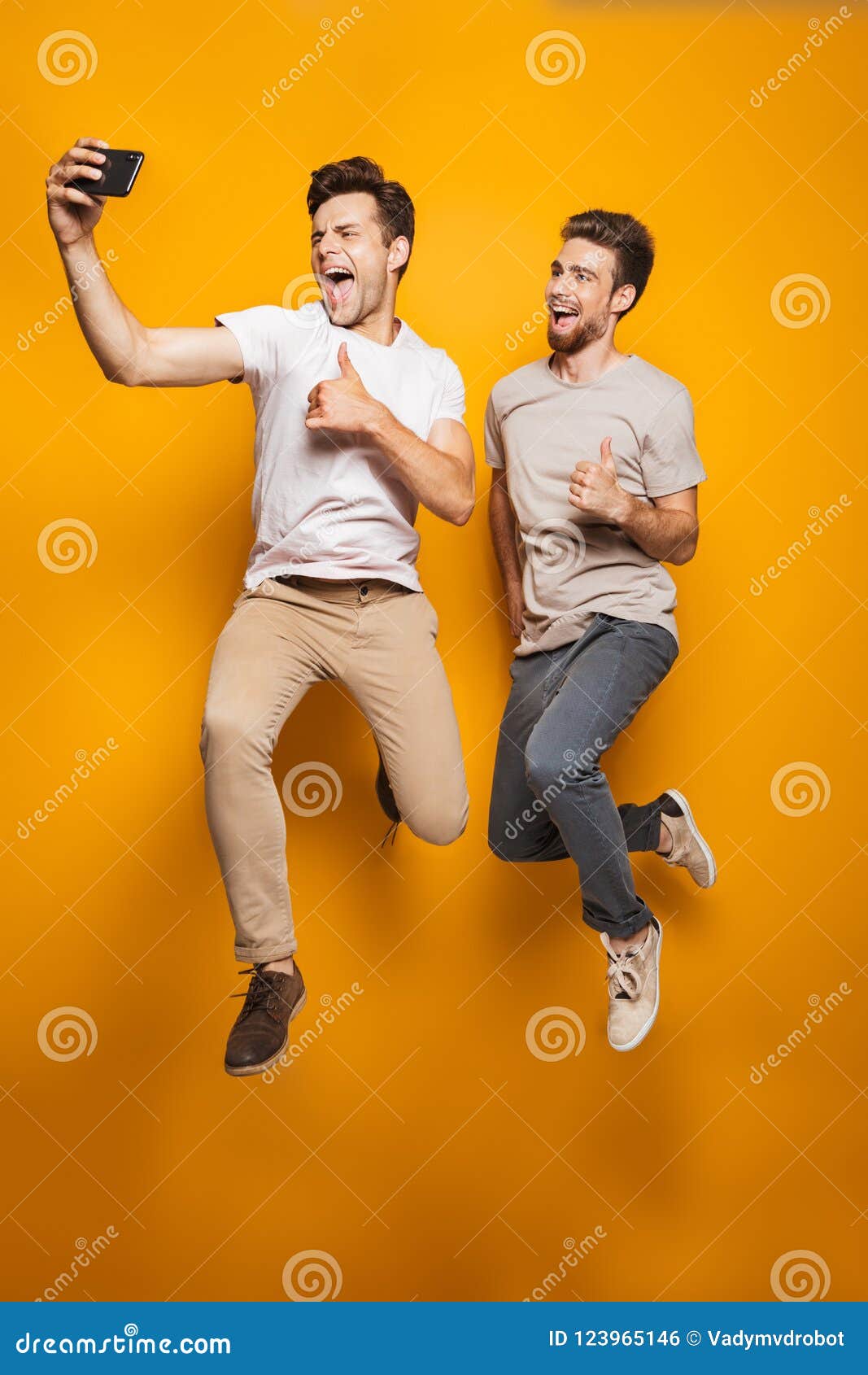 Full Length Portrait of a Two Happy Young Men Best Friends Stock Photo ... Full Length Portrait of a Two Happy Young Men Best Friends Stock Photo ...