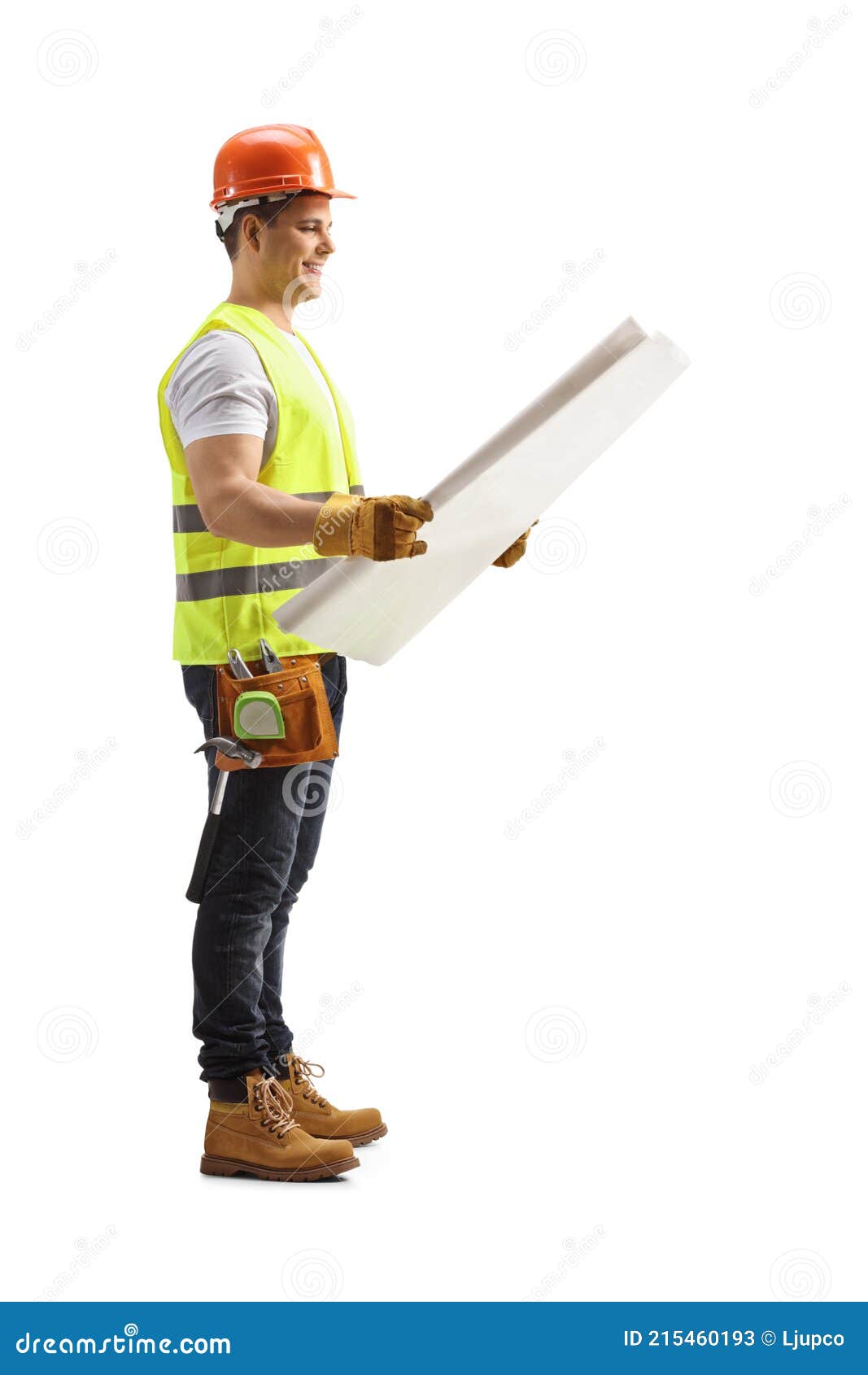 Full Length Profile Shot of a Construction Worker Looking at a ...