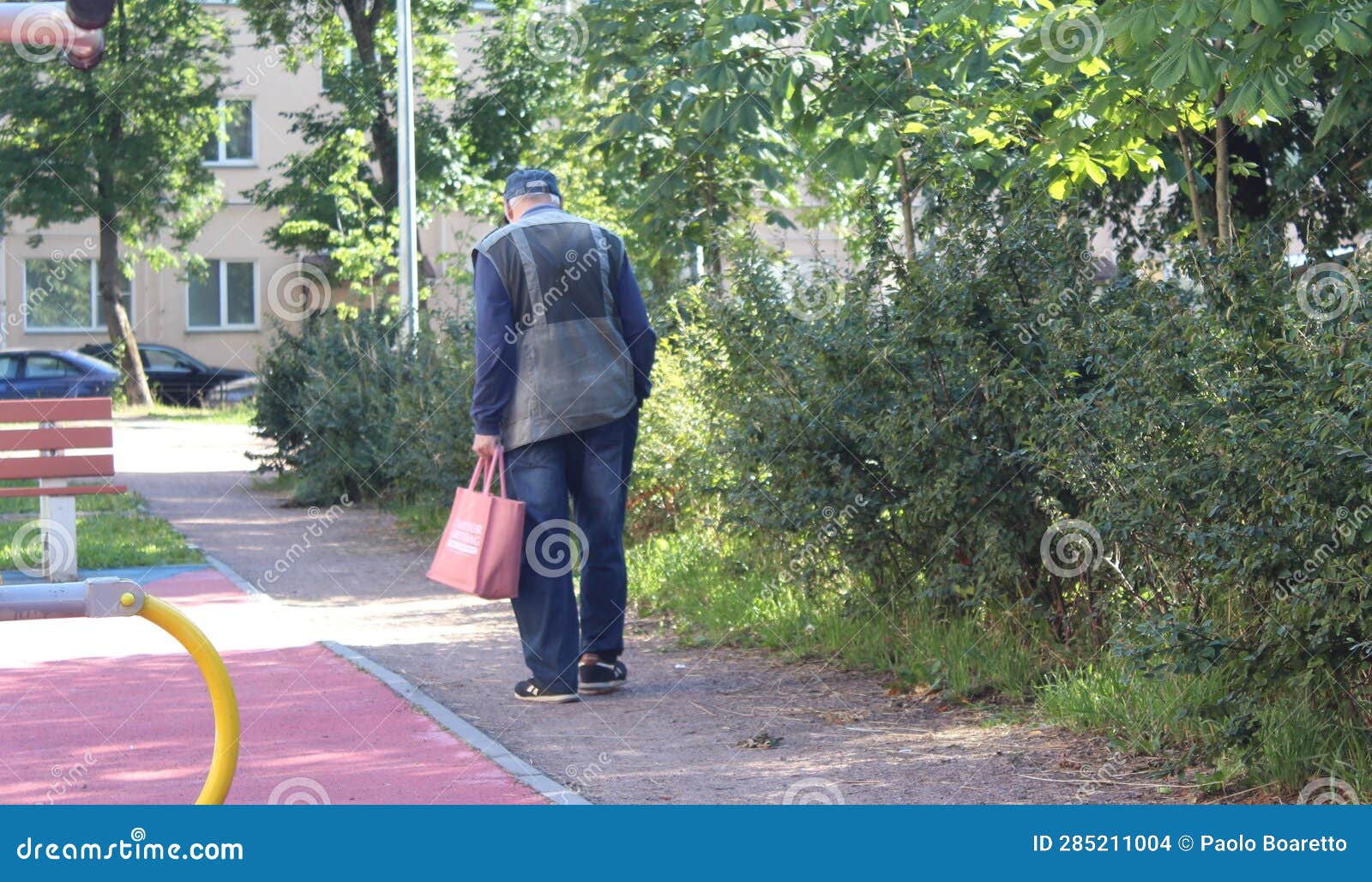 Full Length Profile Shot of a Senior Man Walking in a Park Editorial ...