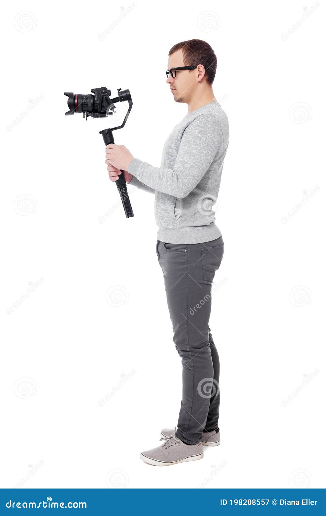 Full Length Side View of Professional Videographer Using Dslr Camera on ...