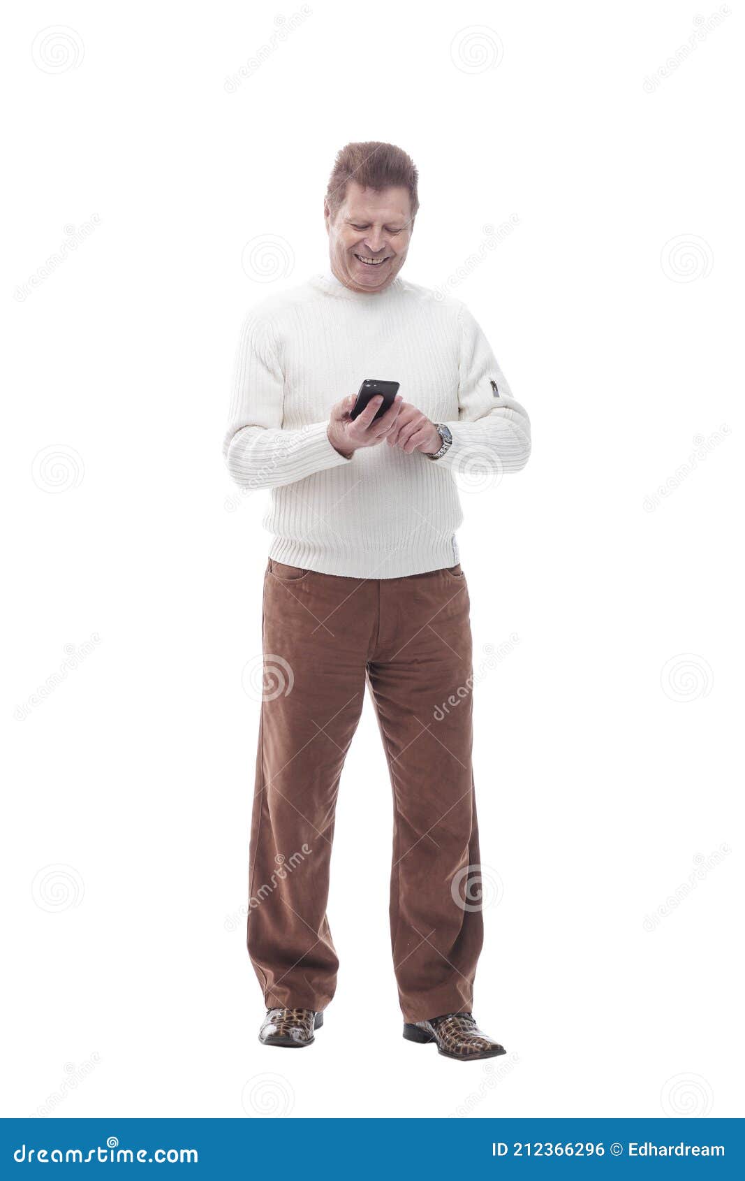 Full- Length . Smiling Man Reading a Message on His Smartphone Stock ...