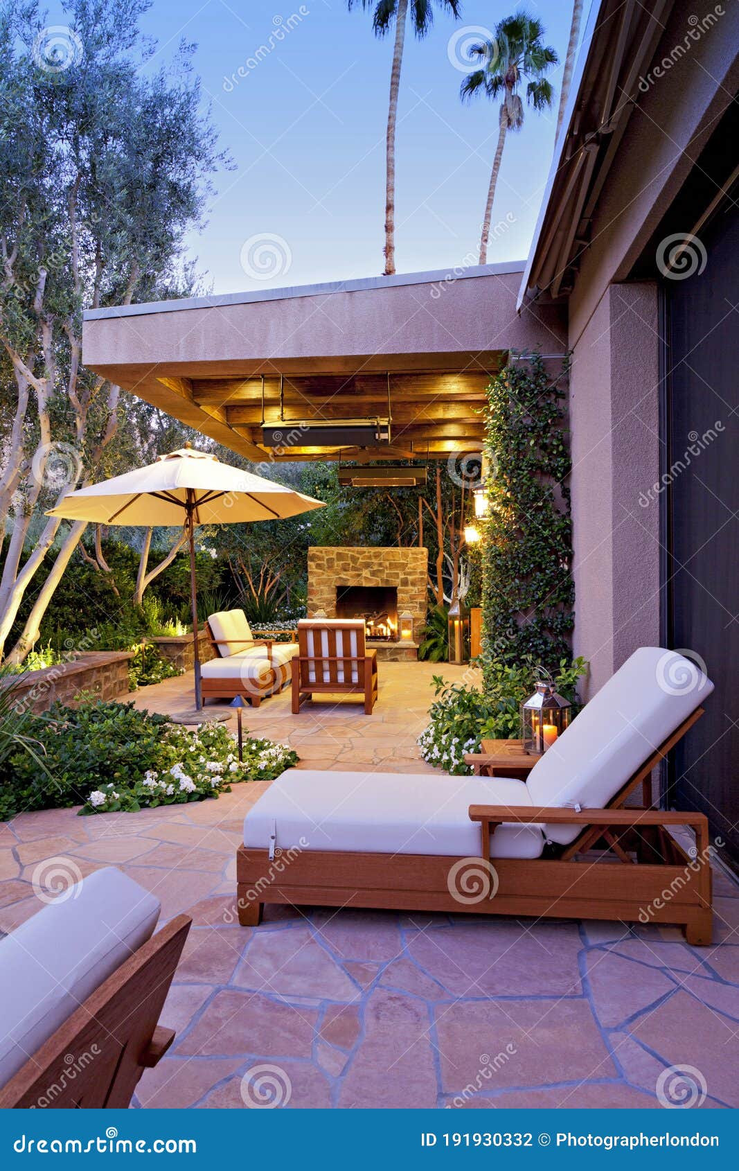 Full Length View of Patio at Dusk Stock Photo - Image of lamp, blur ...
