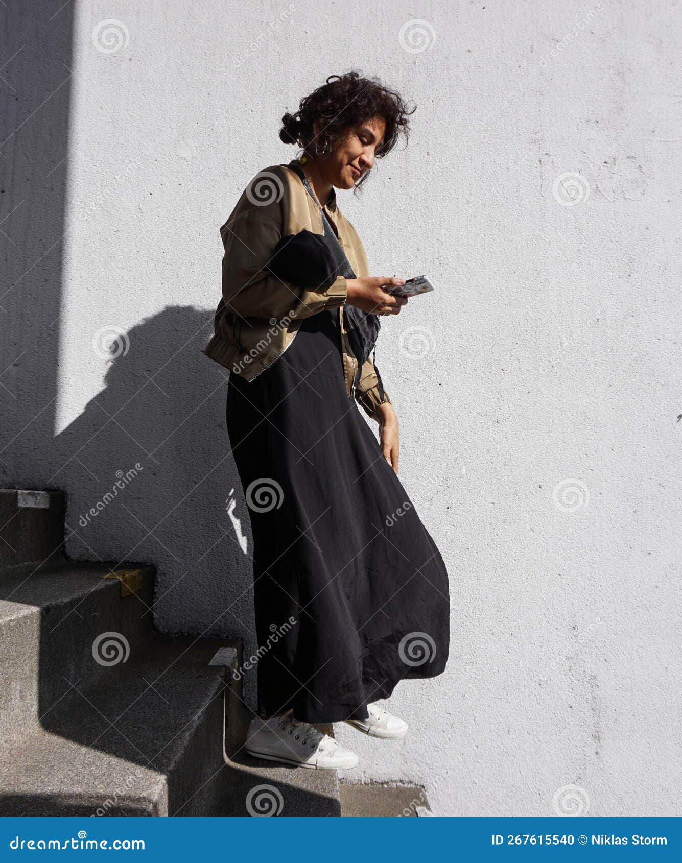 Full Length of Woman Standing on Steps Stock Photo - Image of hair ...