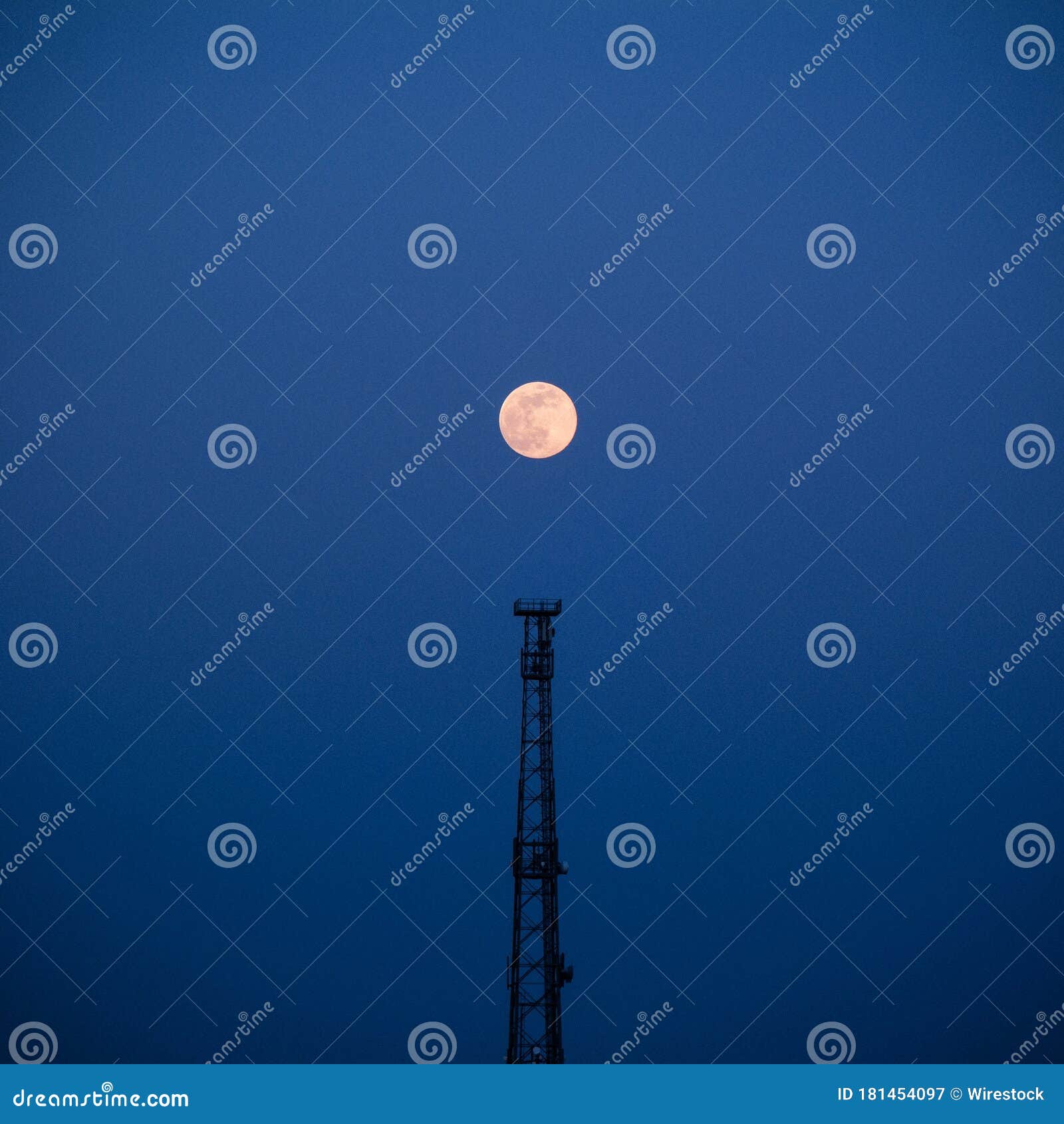 Full Moon Above a Tower in the Blue Sky in the Evening - Great for ...