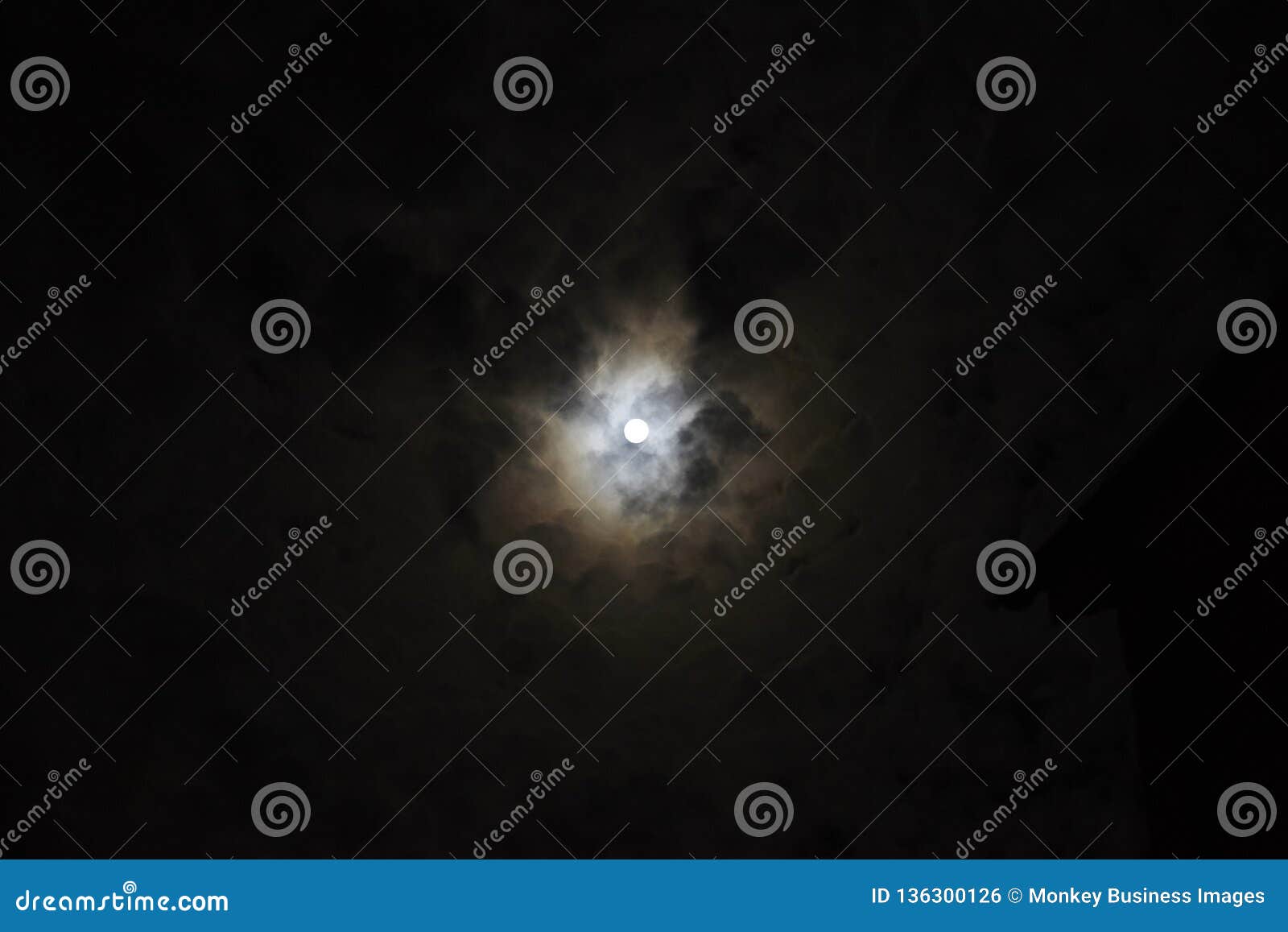 Full Moon Appearing through Clouds at Night Stock Photo - Image of ...