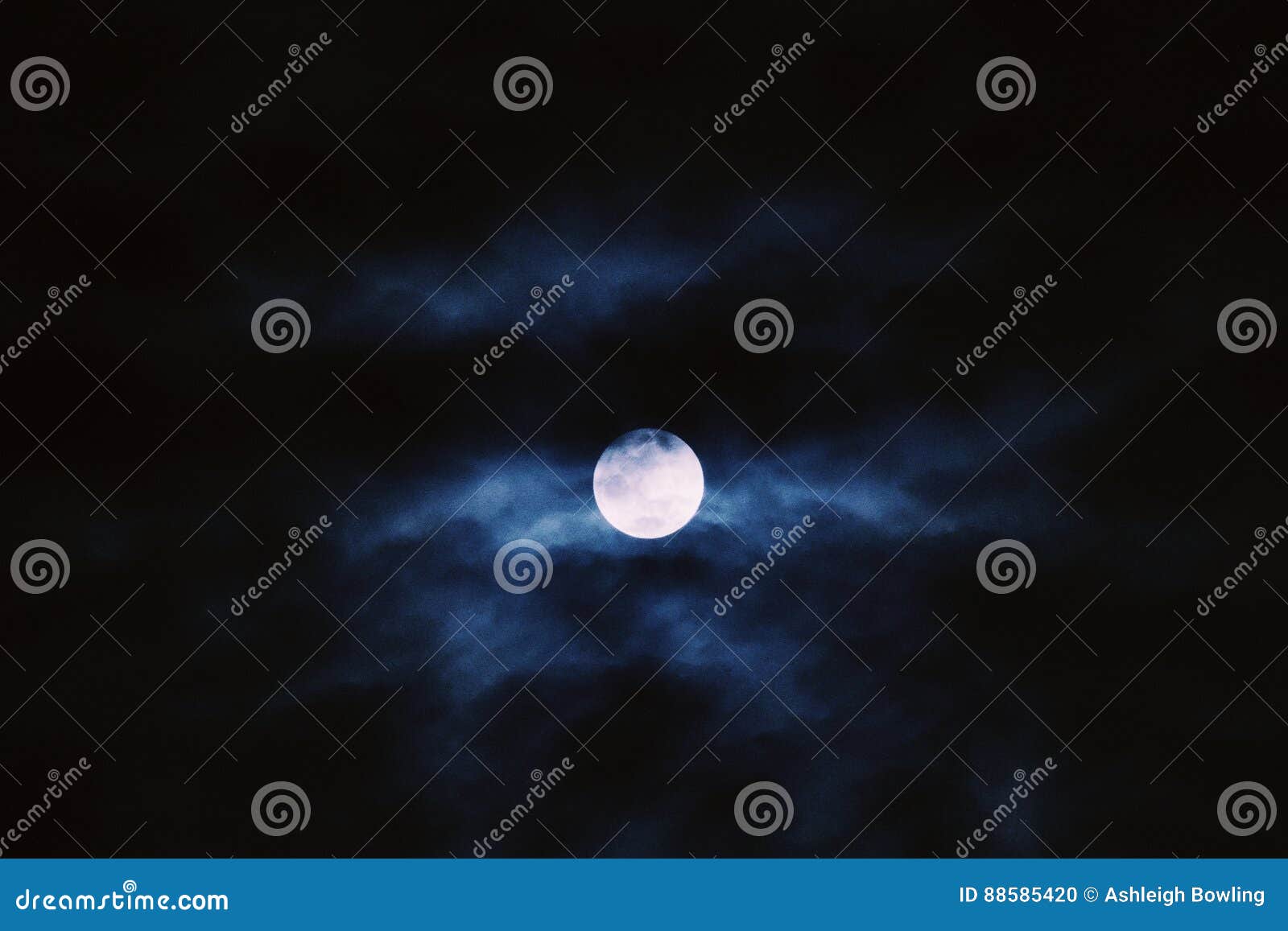Full moon behind clouds. stock photo. Image of clouds - 88585420