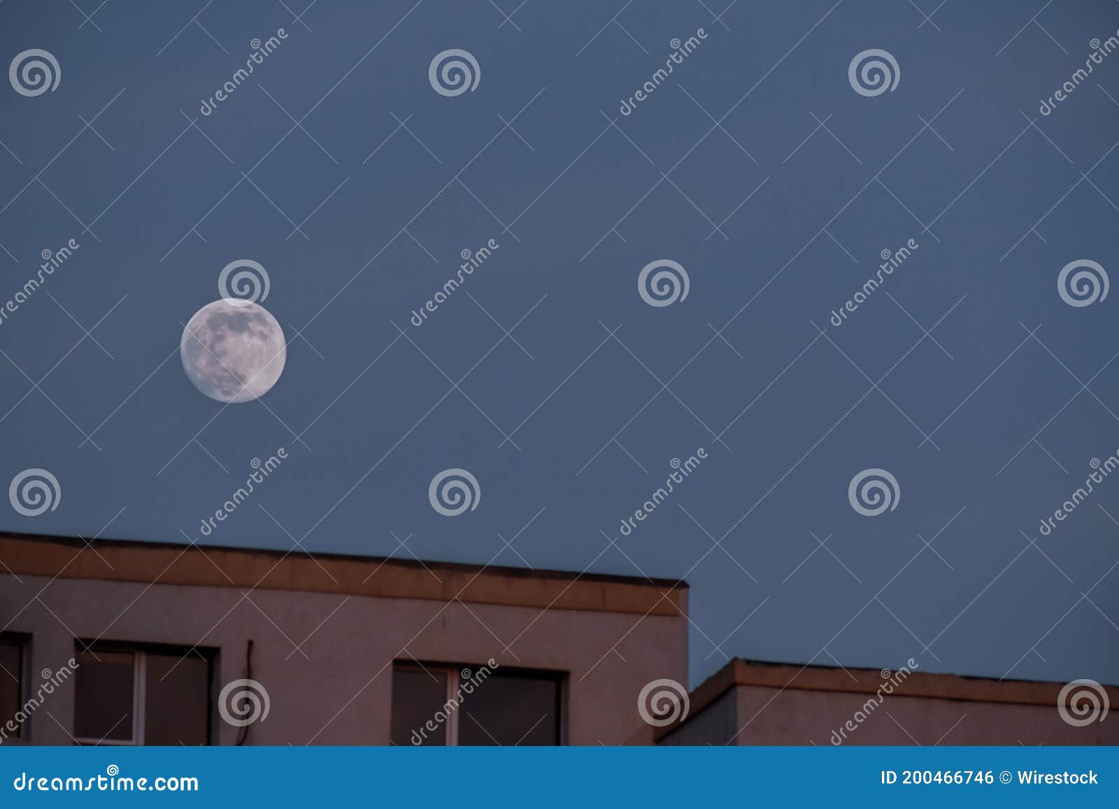 Full Moon in the Blue Clear Sky Above a Building Stock Photo - Image of ...