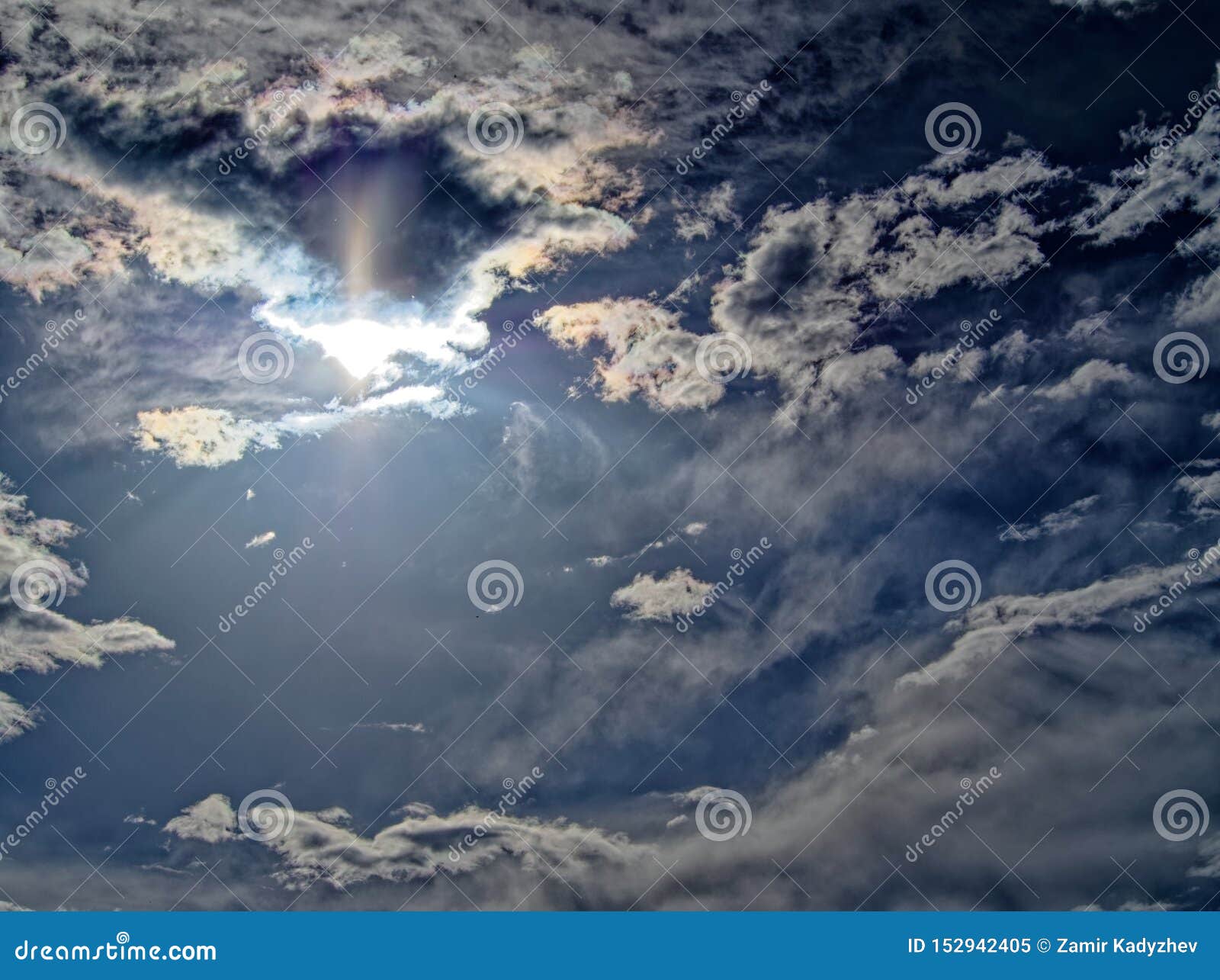 The Full Moon between the Clouds in the Night Sky Stock Image - Image ...