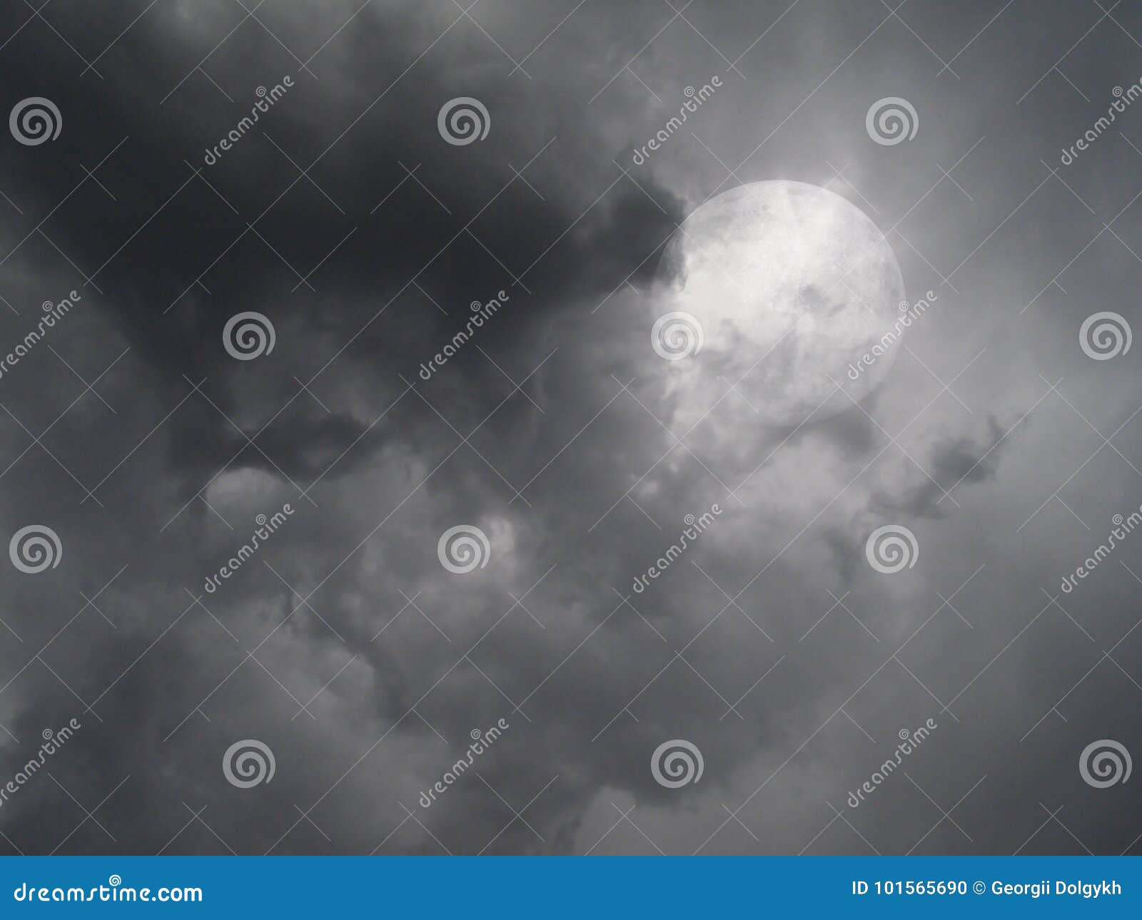 Full moon on a cloudy sky stock photo. Image of lunar - 101565690